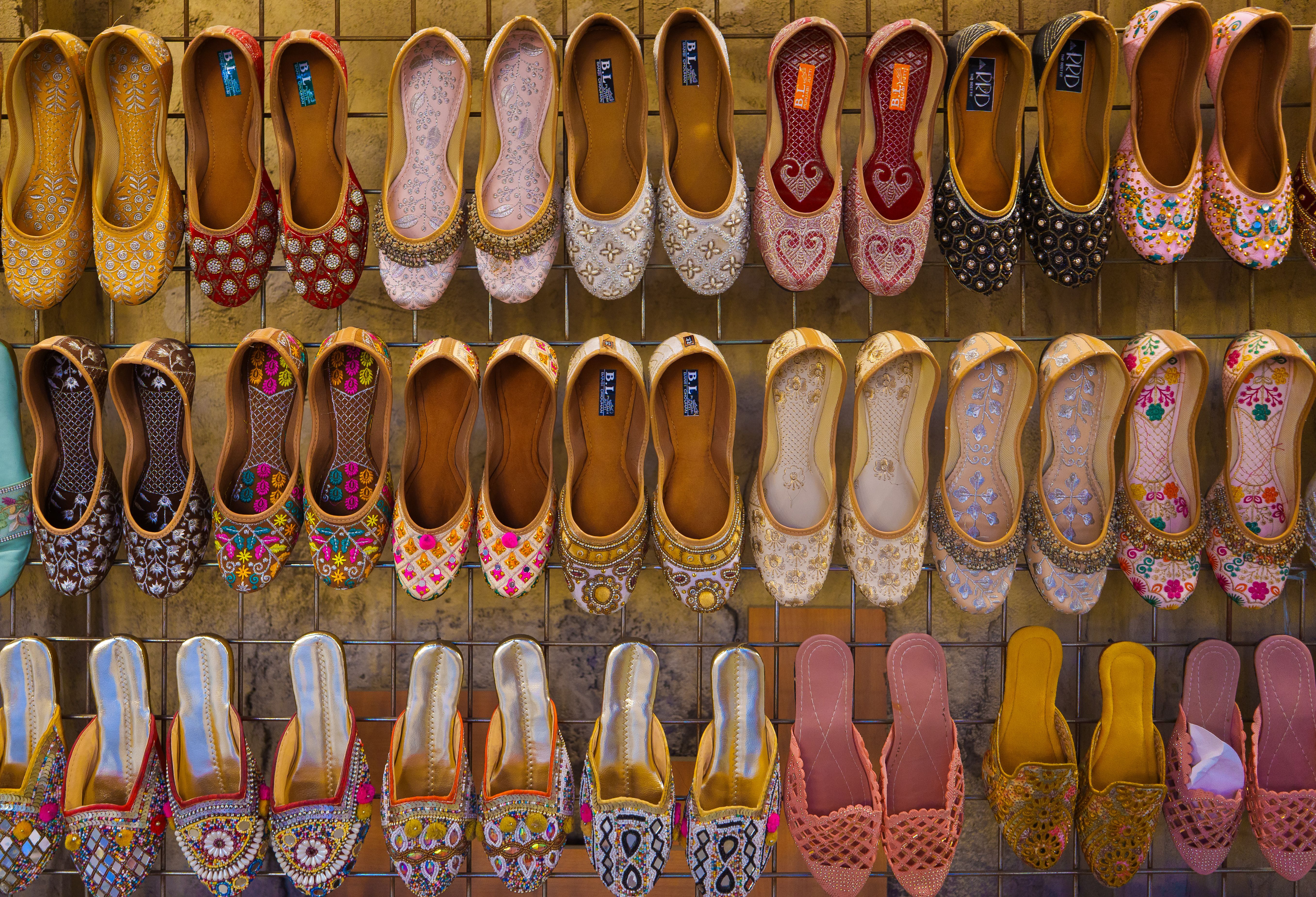 Colorful Traditional Footwear Display in Dubai · Free Stock Photo