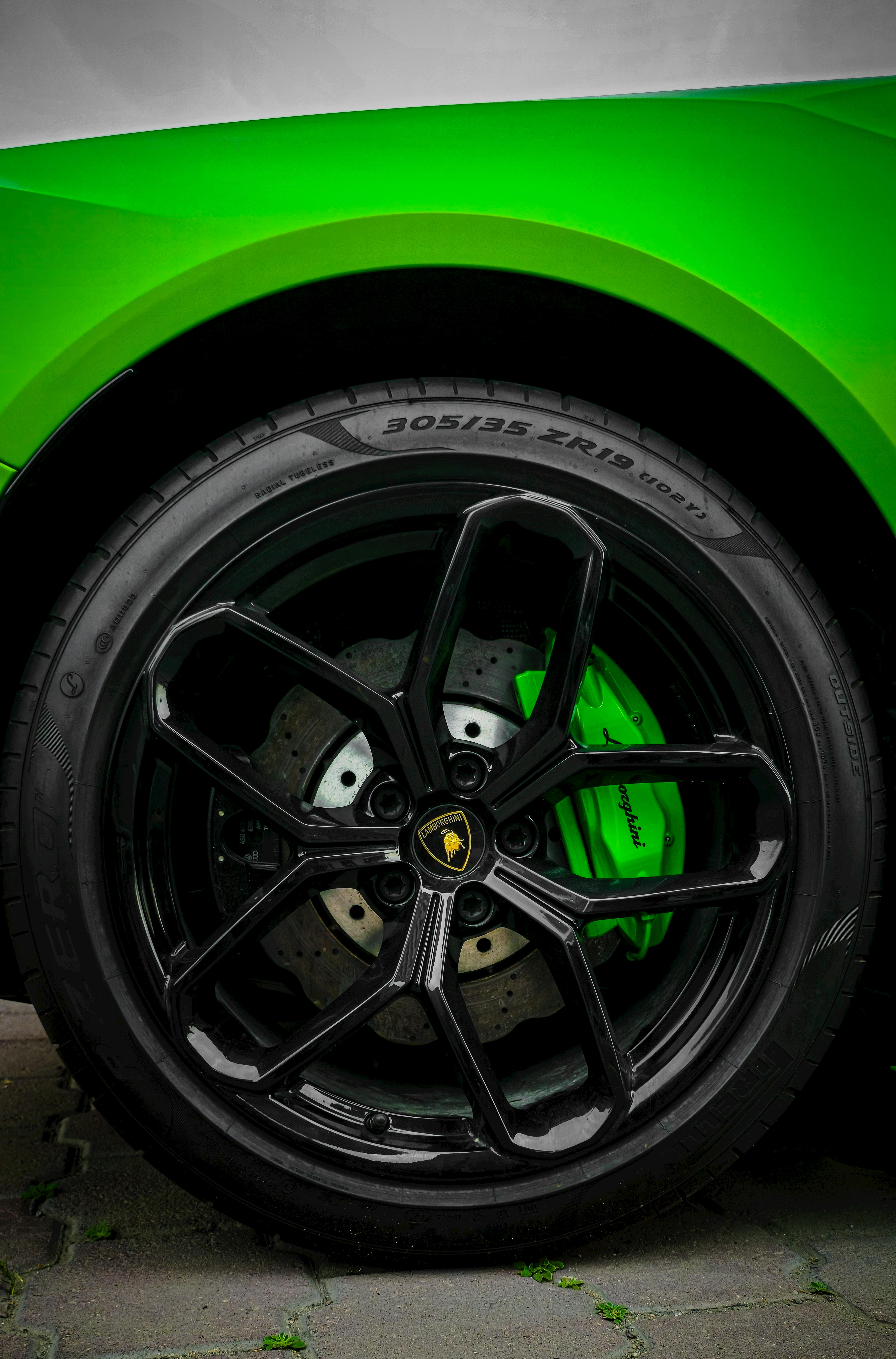 A Close-Up Shot of a Ferrari Wheel · Free Stock Photo