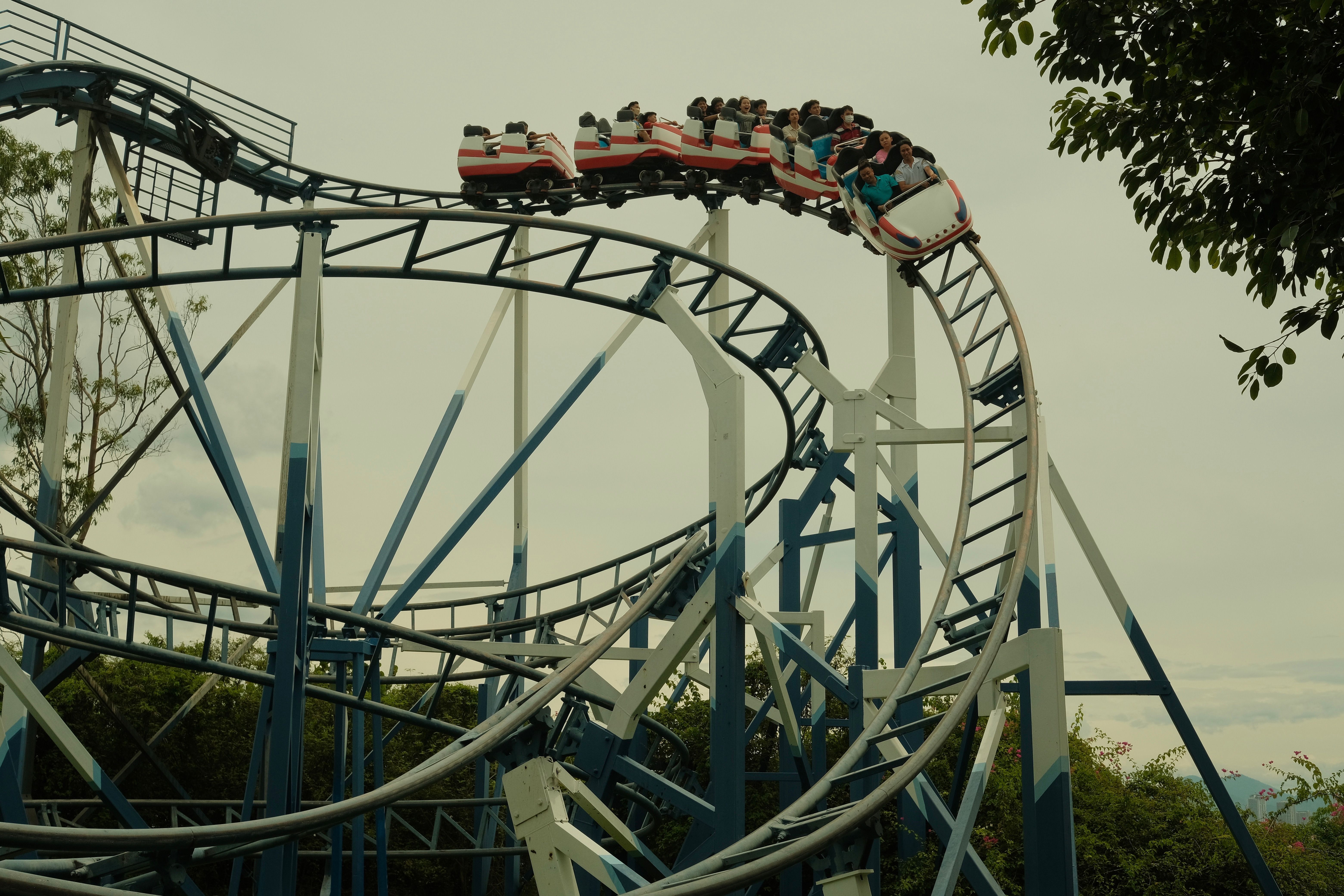 Exciting Roller Coaster Ride in Amusement Park · Free Stock Photo