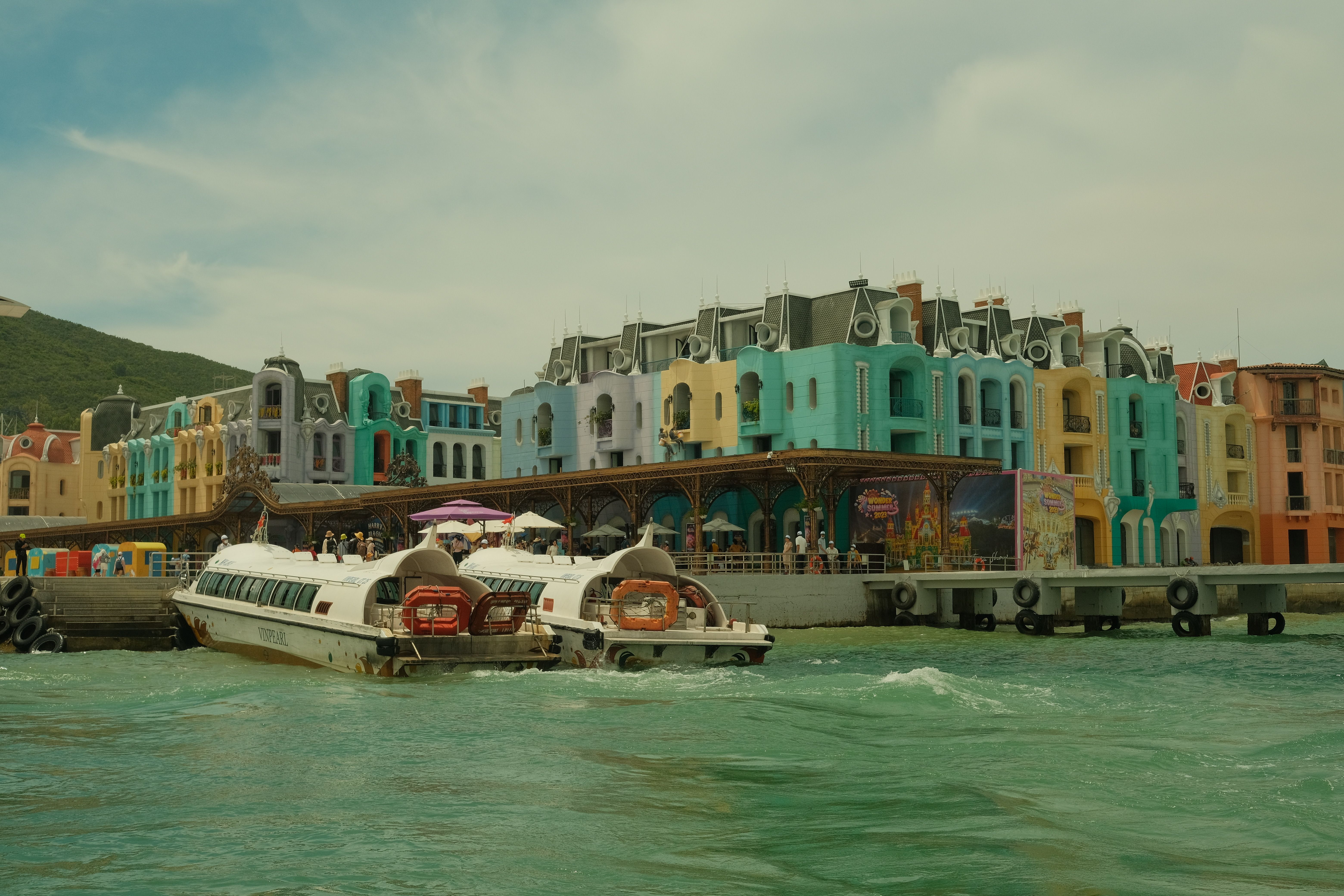 Colorful Waterfront Buildings with Cruise Ship · Free Stock Photo