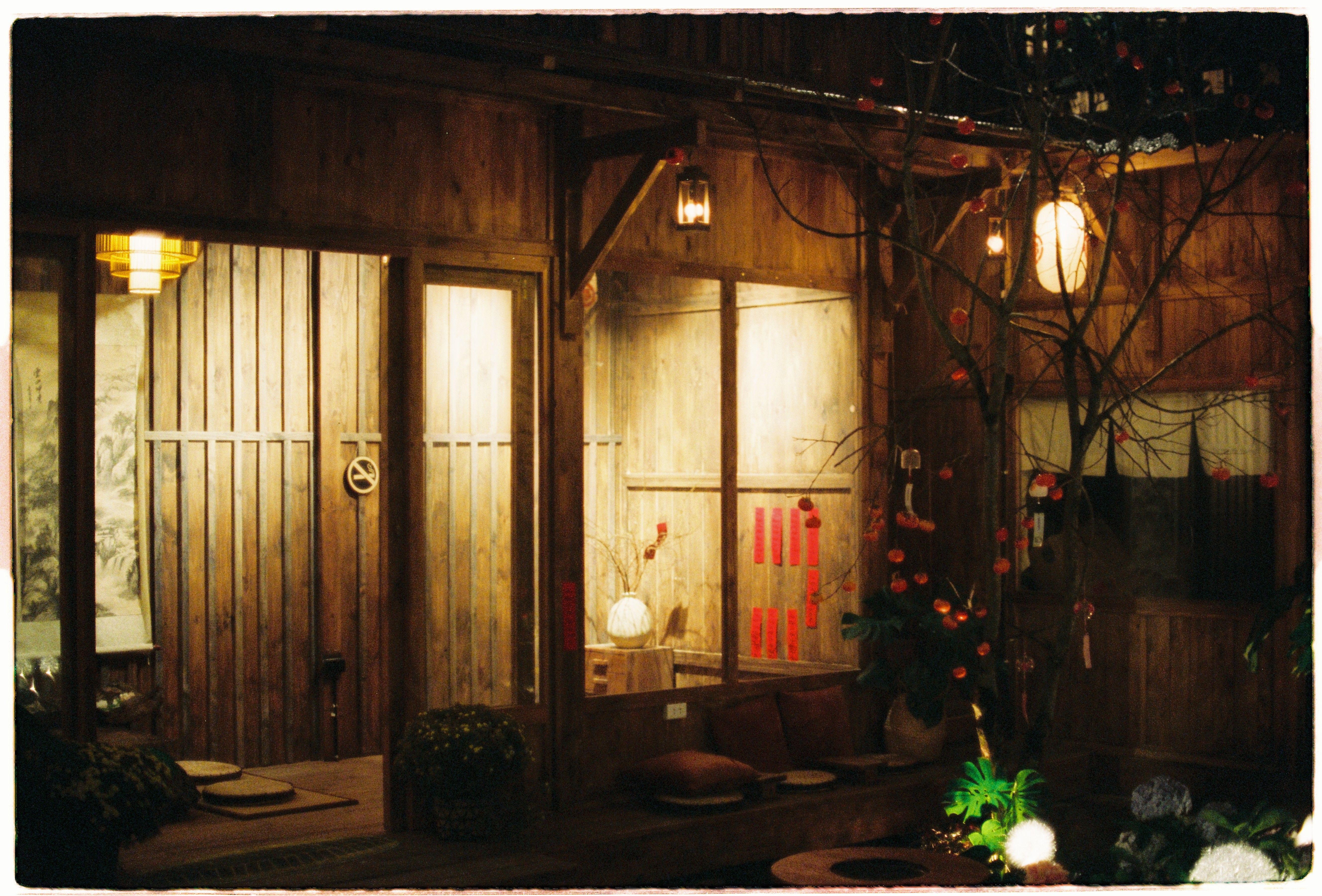 Cozy Outdoor Café with Flags and Vintage Decor · Free Stock Photo