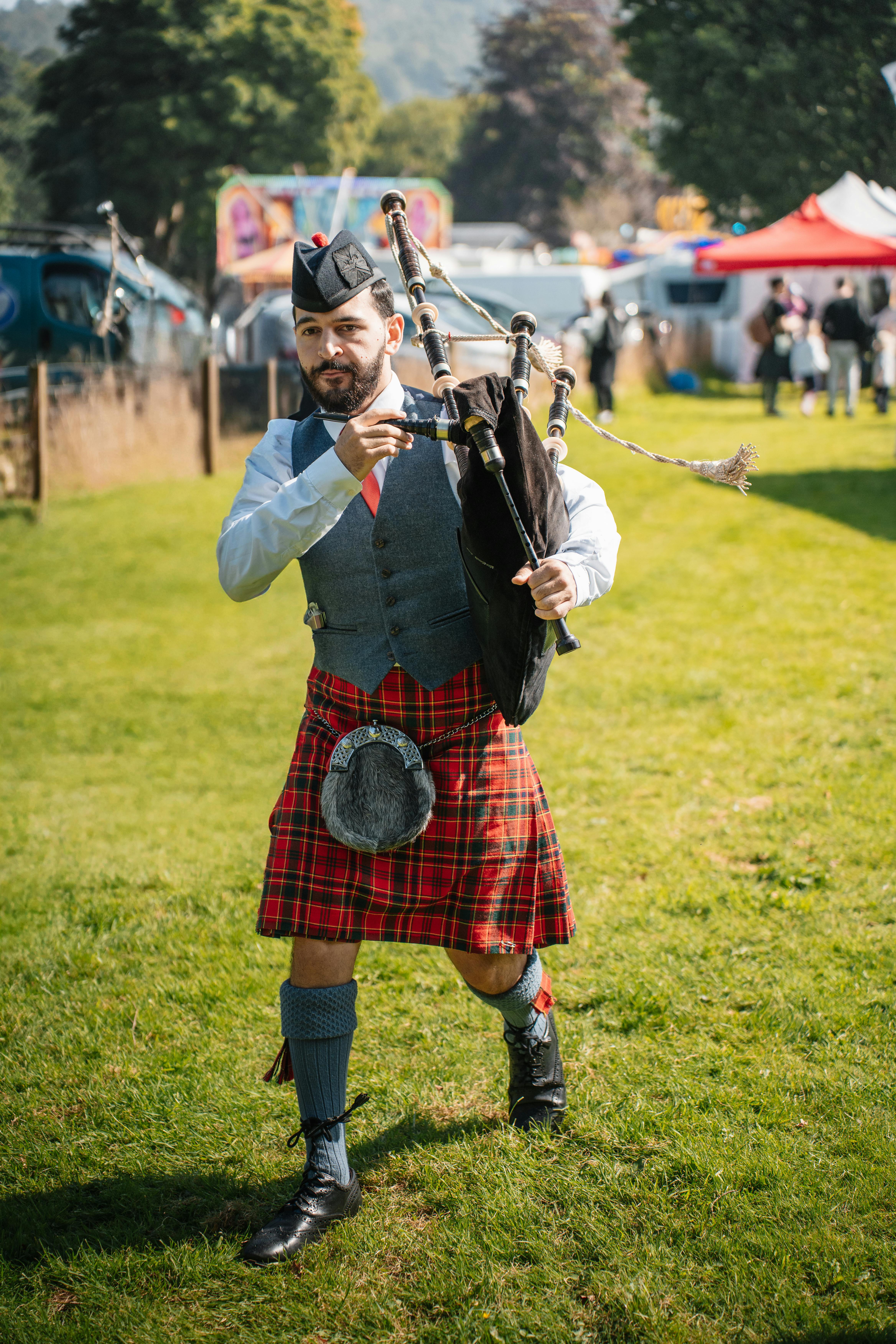 Scottish Bagpipe Player in Traditional Kilt · Free Stock Photo