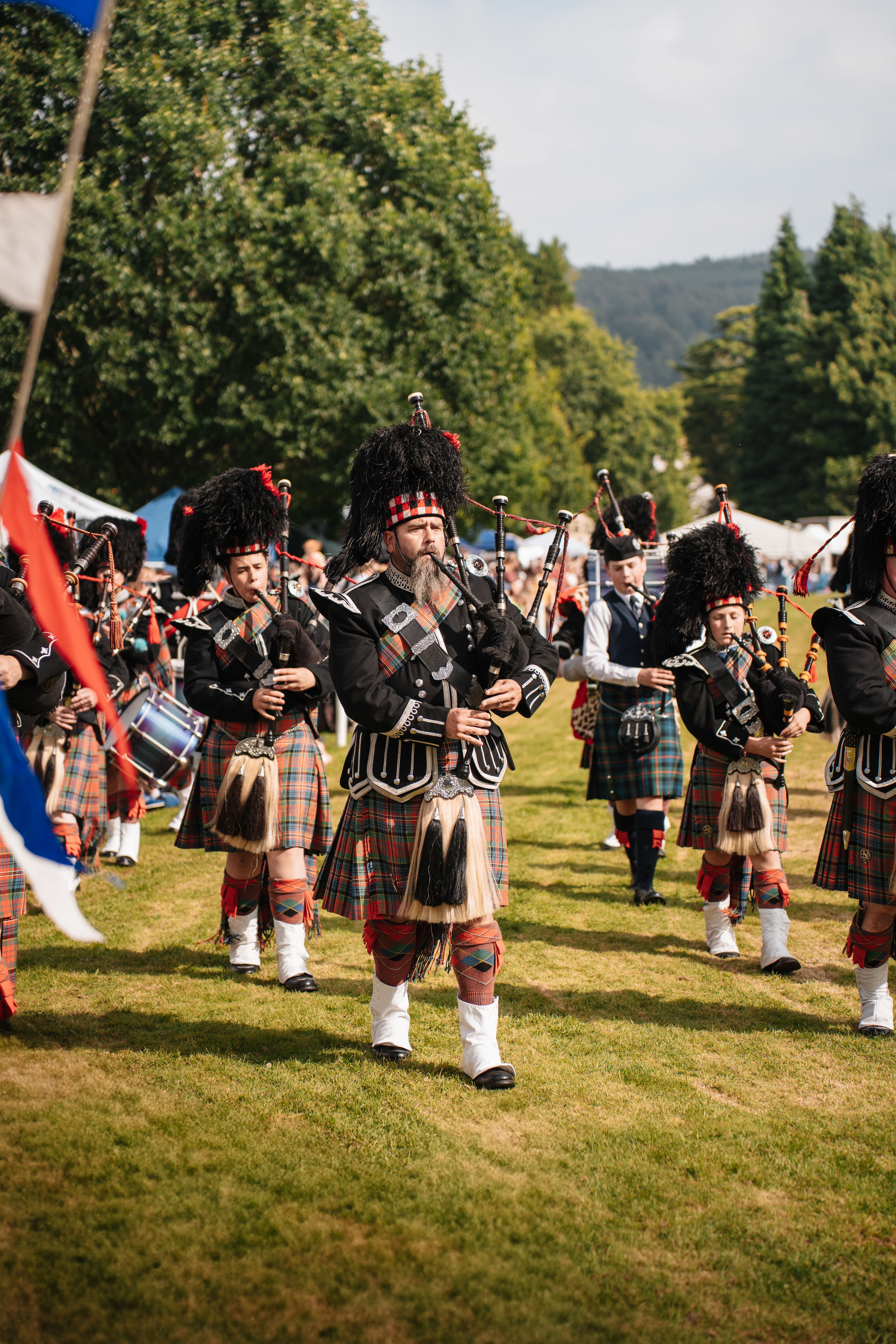 Traditional Scottish Bagpipers in Highland Games · Free Stock Photo