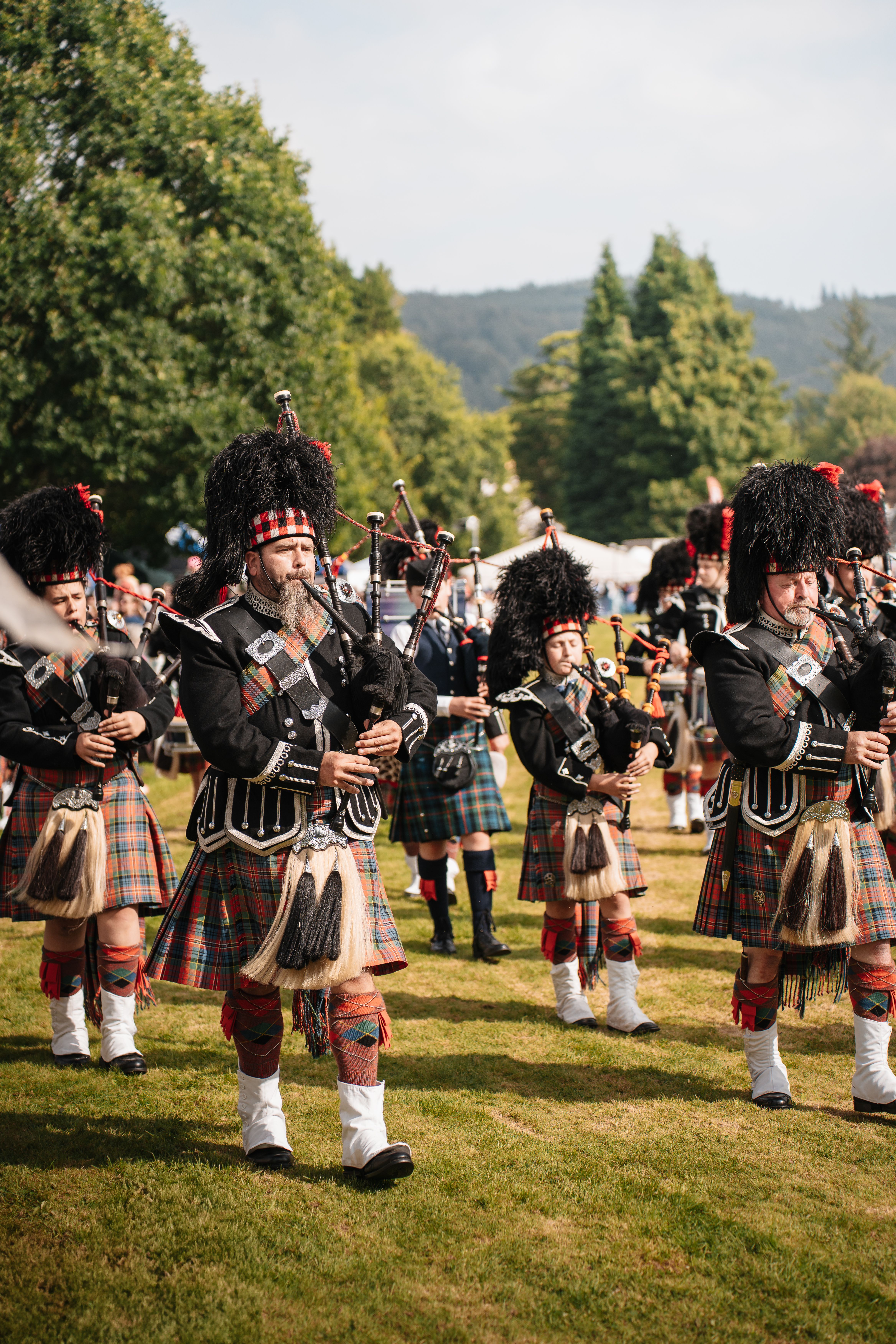 Traditional Scottish Bagpipers in Parade · Free Stock Photo