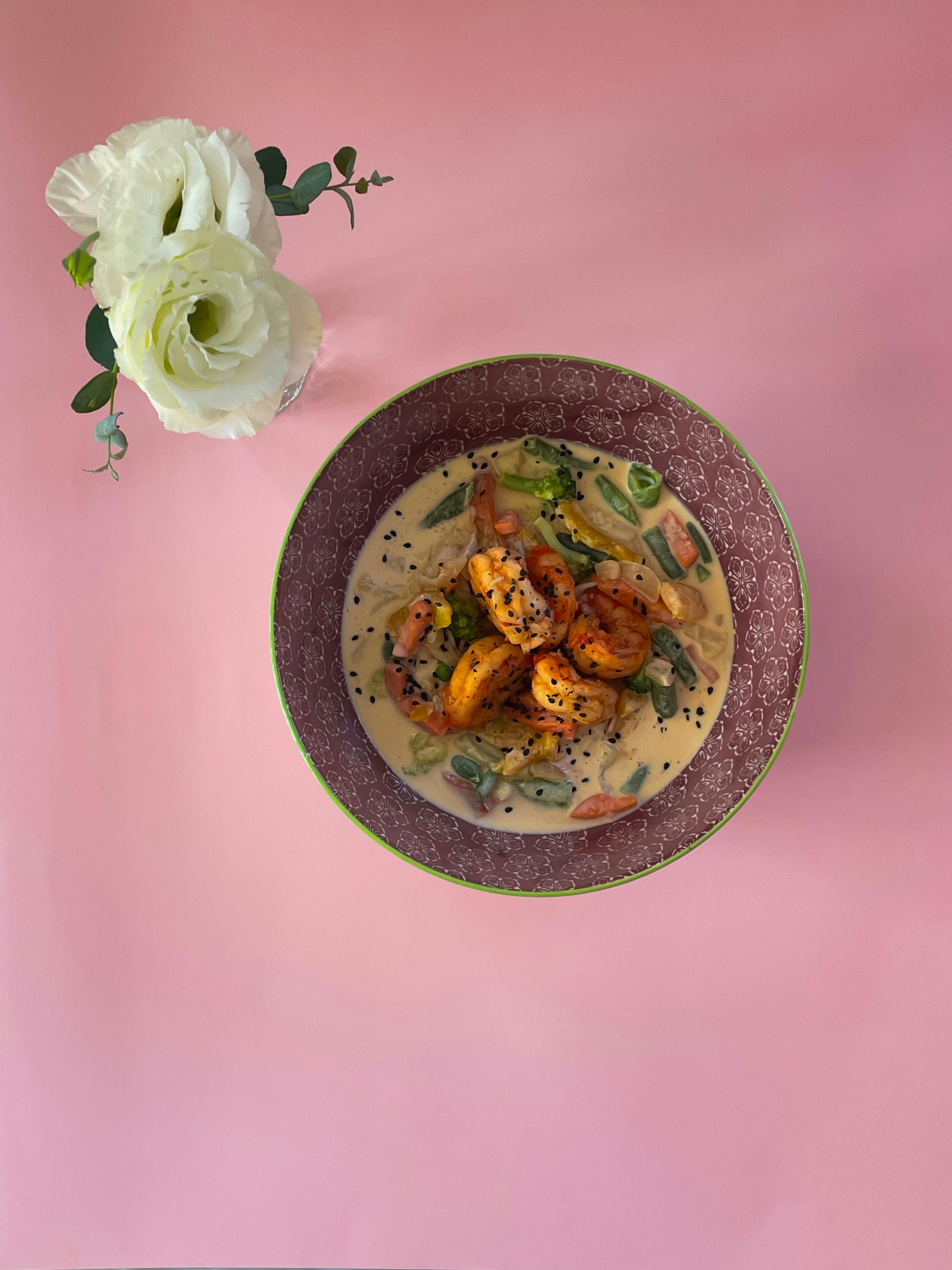 Elegant Shrimp Bowl with Creamy Sauce on Pink · Free Stock Photo