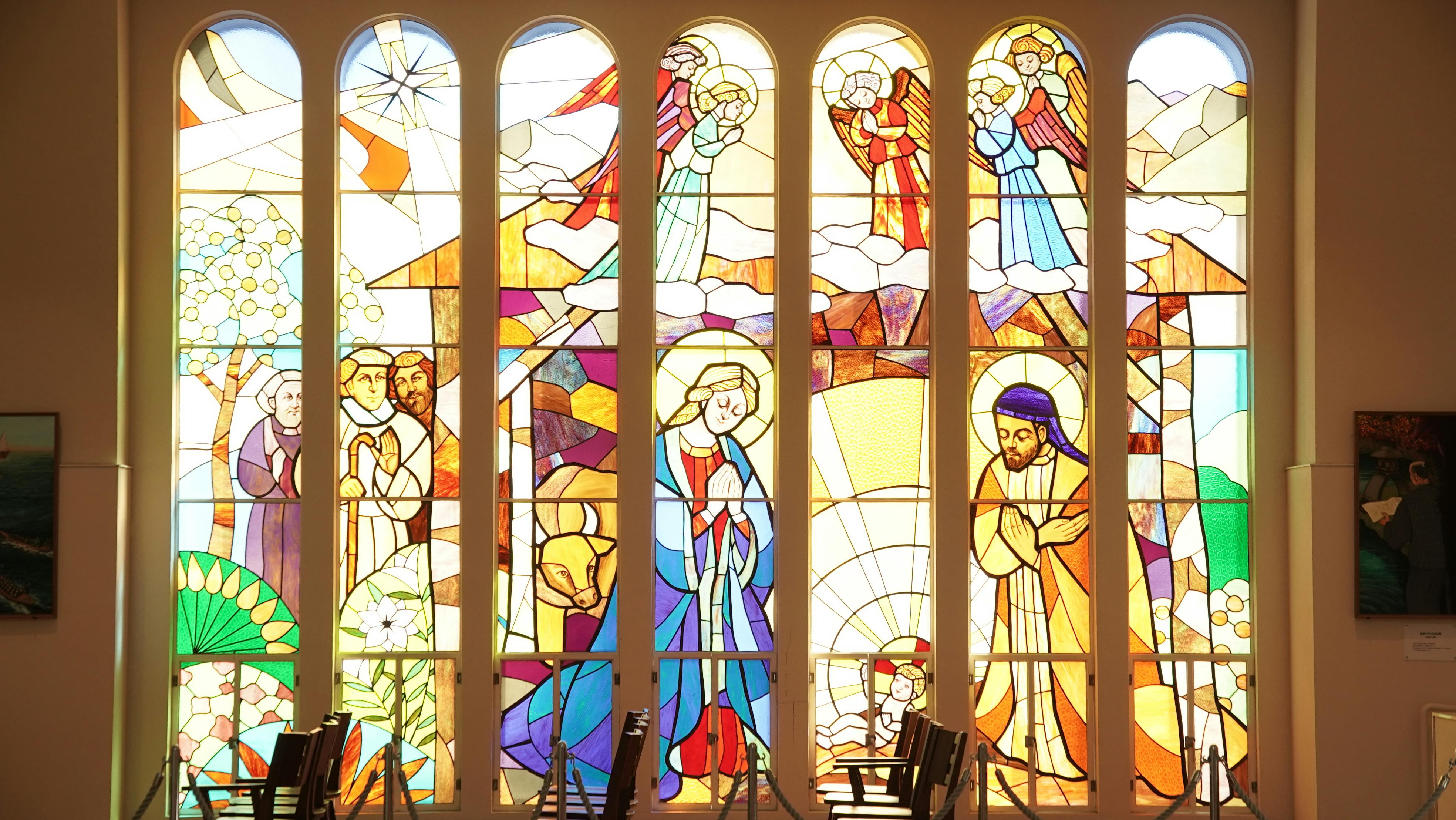 Vibrant Stained Glass Church Windows Depiction · Free Stock Photo