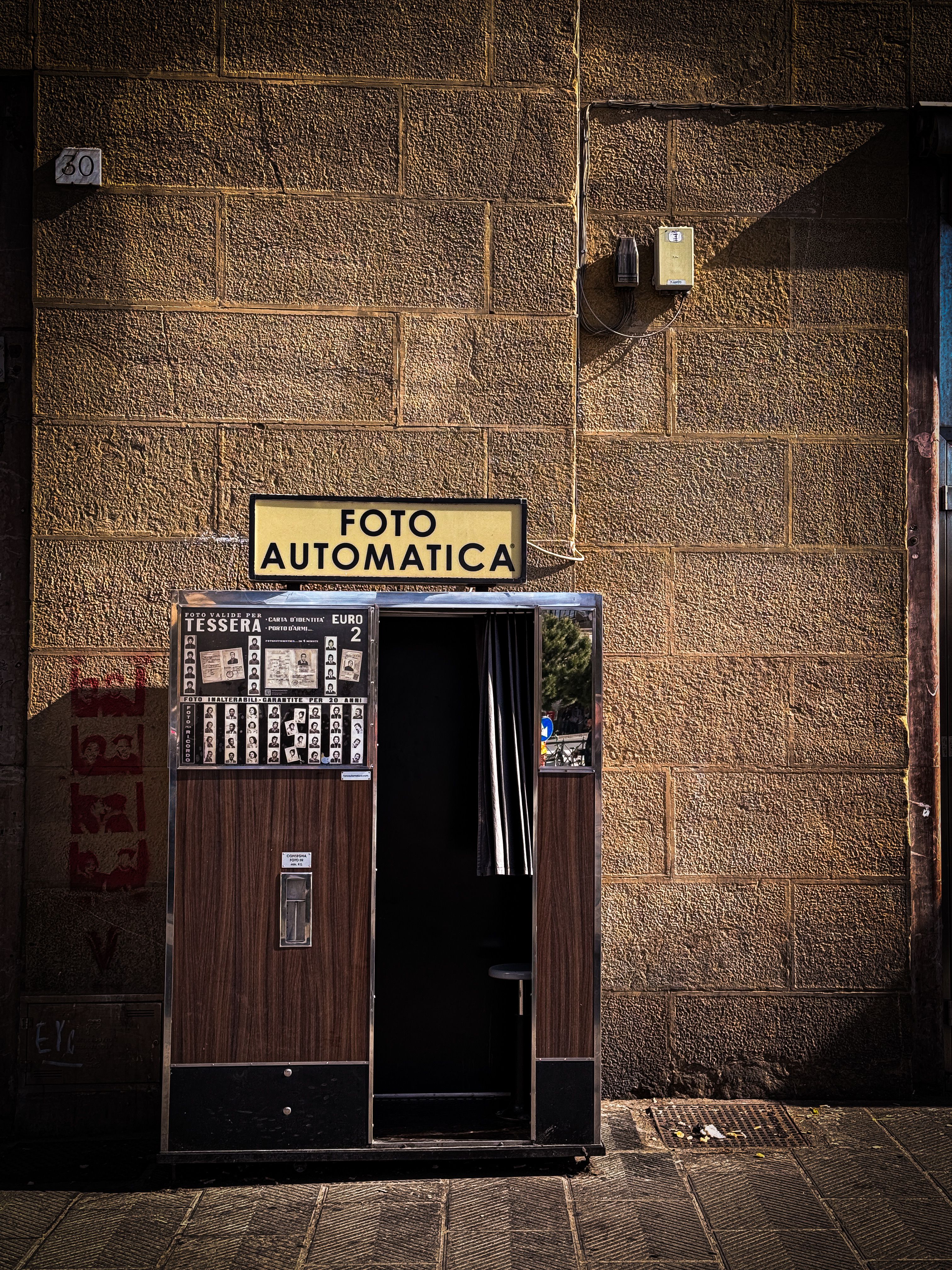 Vintage Photo Booth with Retro Design in Urban Setting · Free Stock Photo