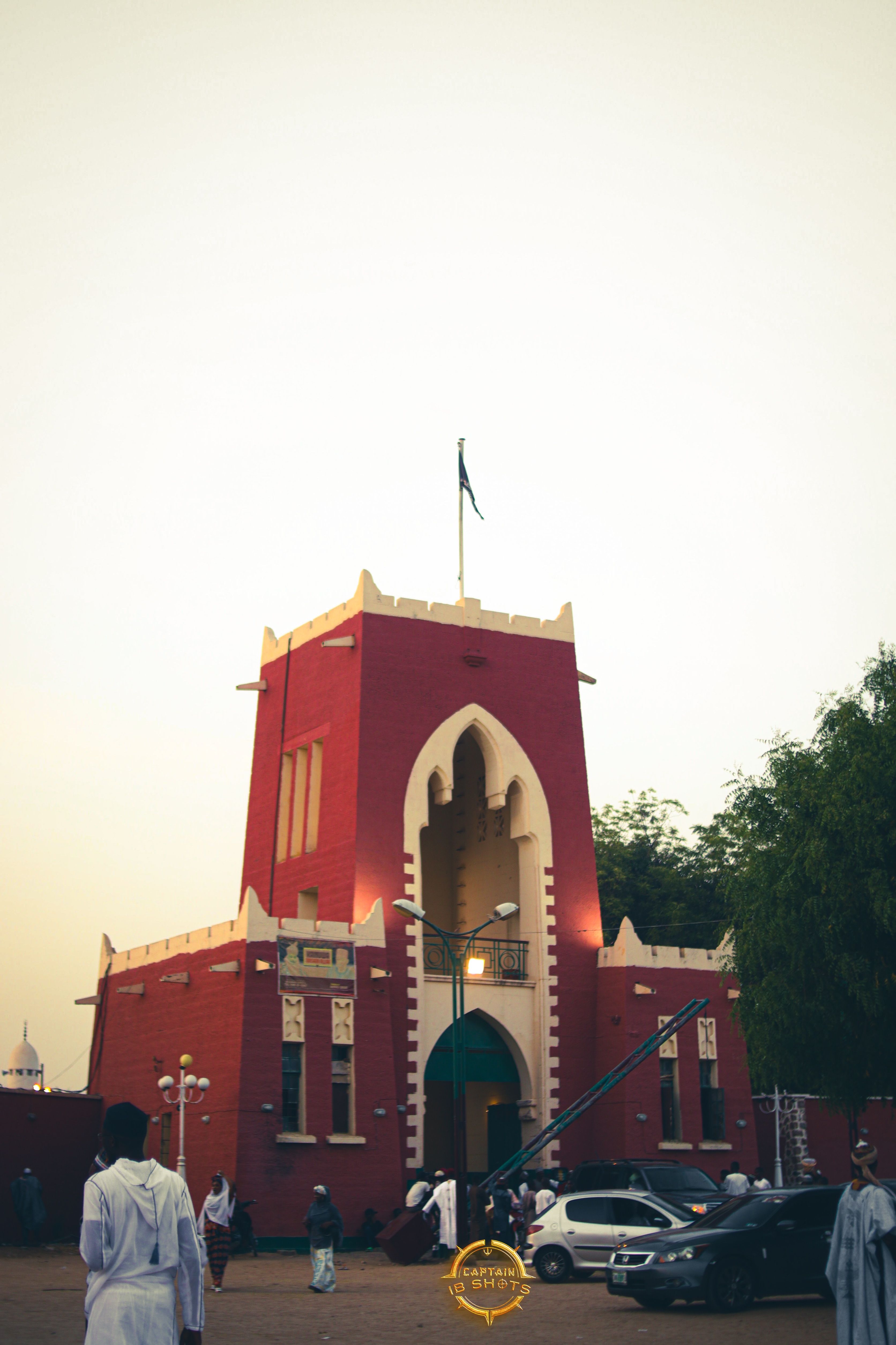 Vibrant Red Architectural Landmark at Sunset · Free Stock Photo