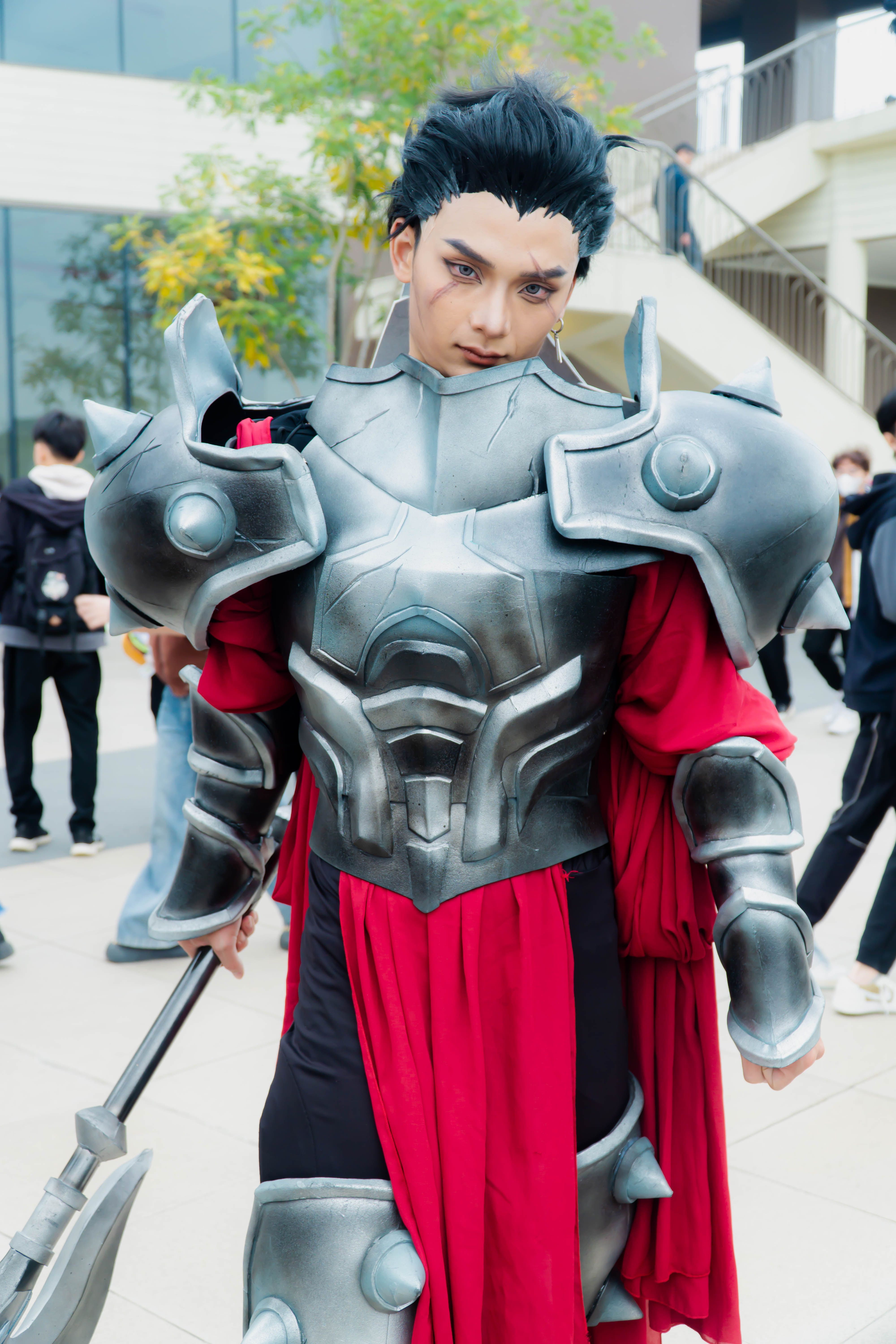 Vibrant Cosplay of Armored Warrior at Convention · Free Stock Photo