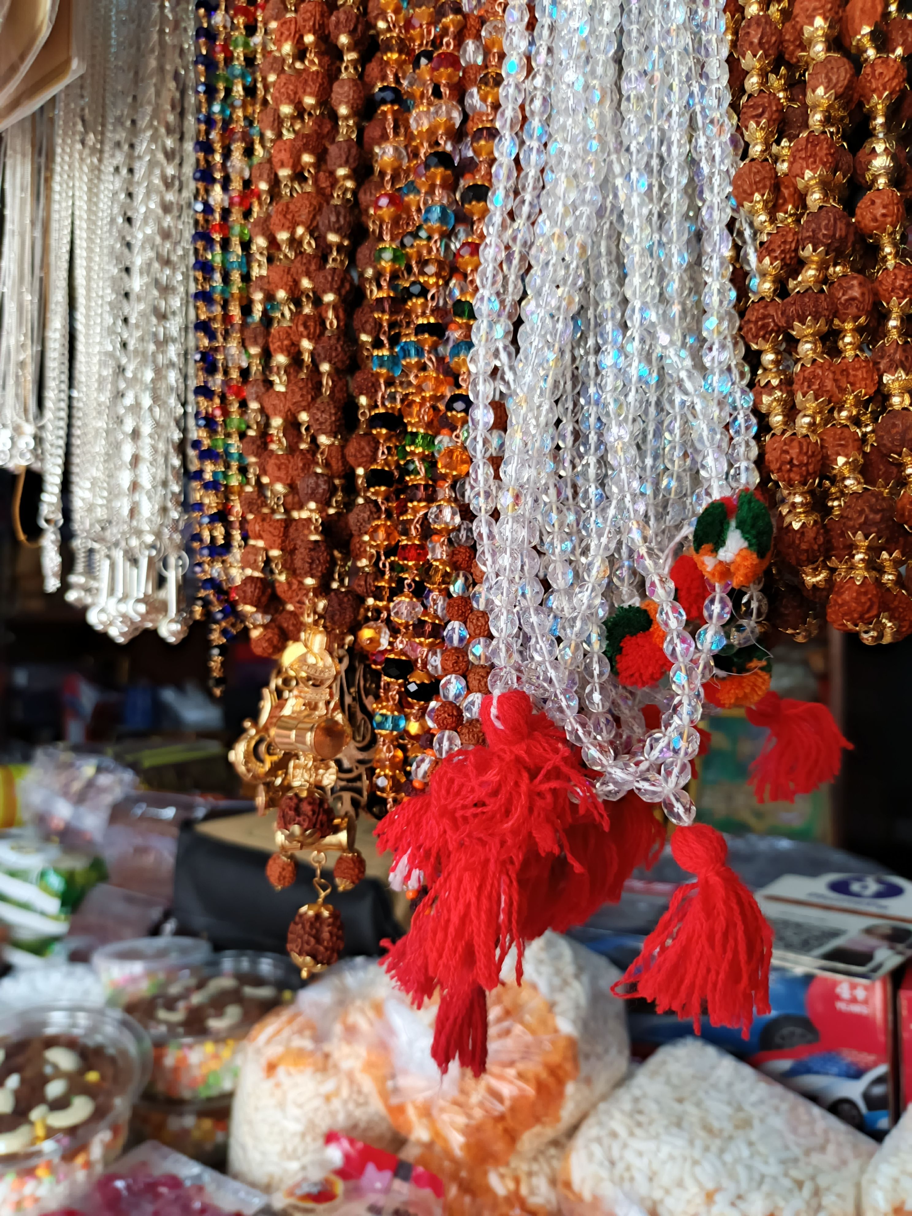 Colorful Bead Necklaces Display in Market Stall · Free Stock Photo