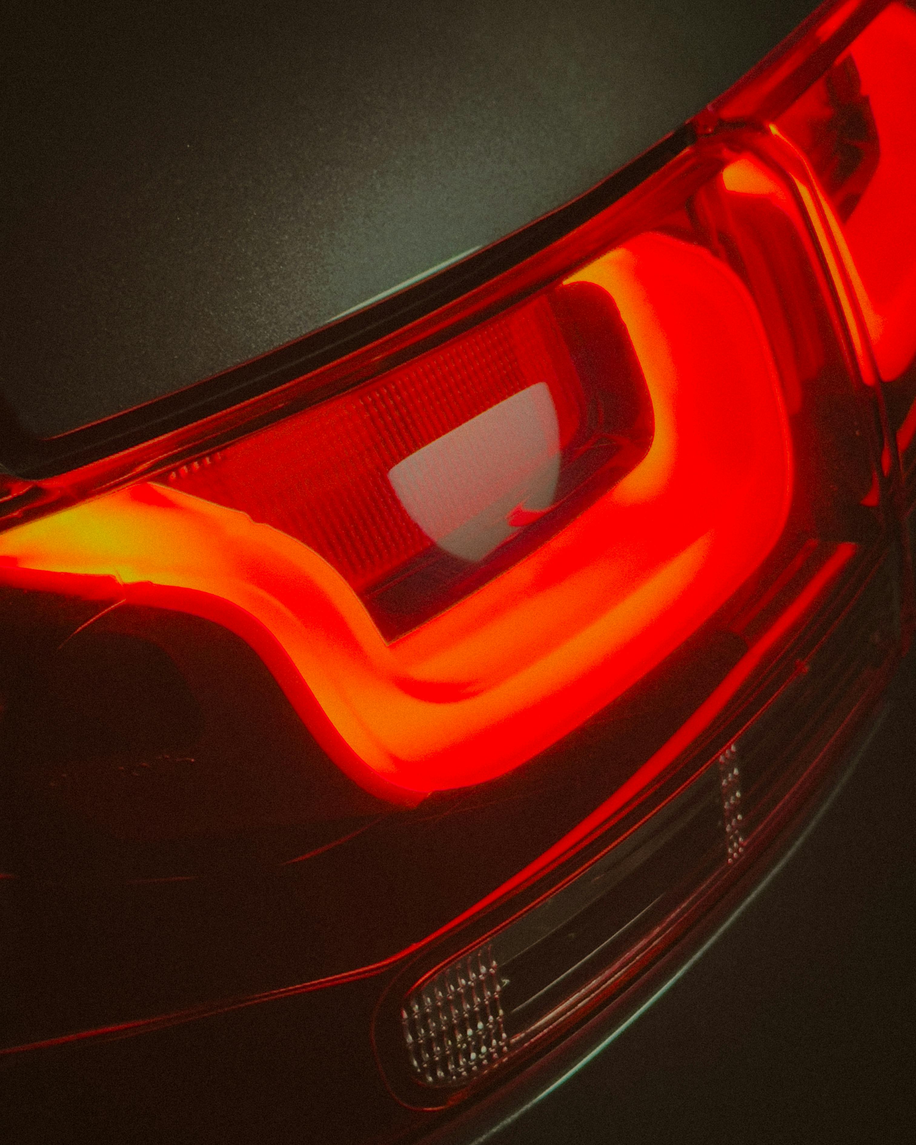 Close-up of modern car tail light design · Free Stock Photo