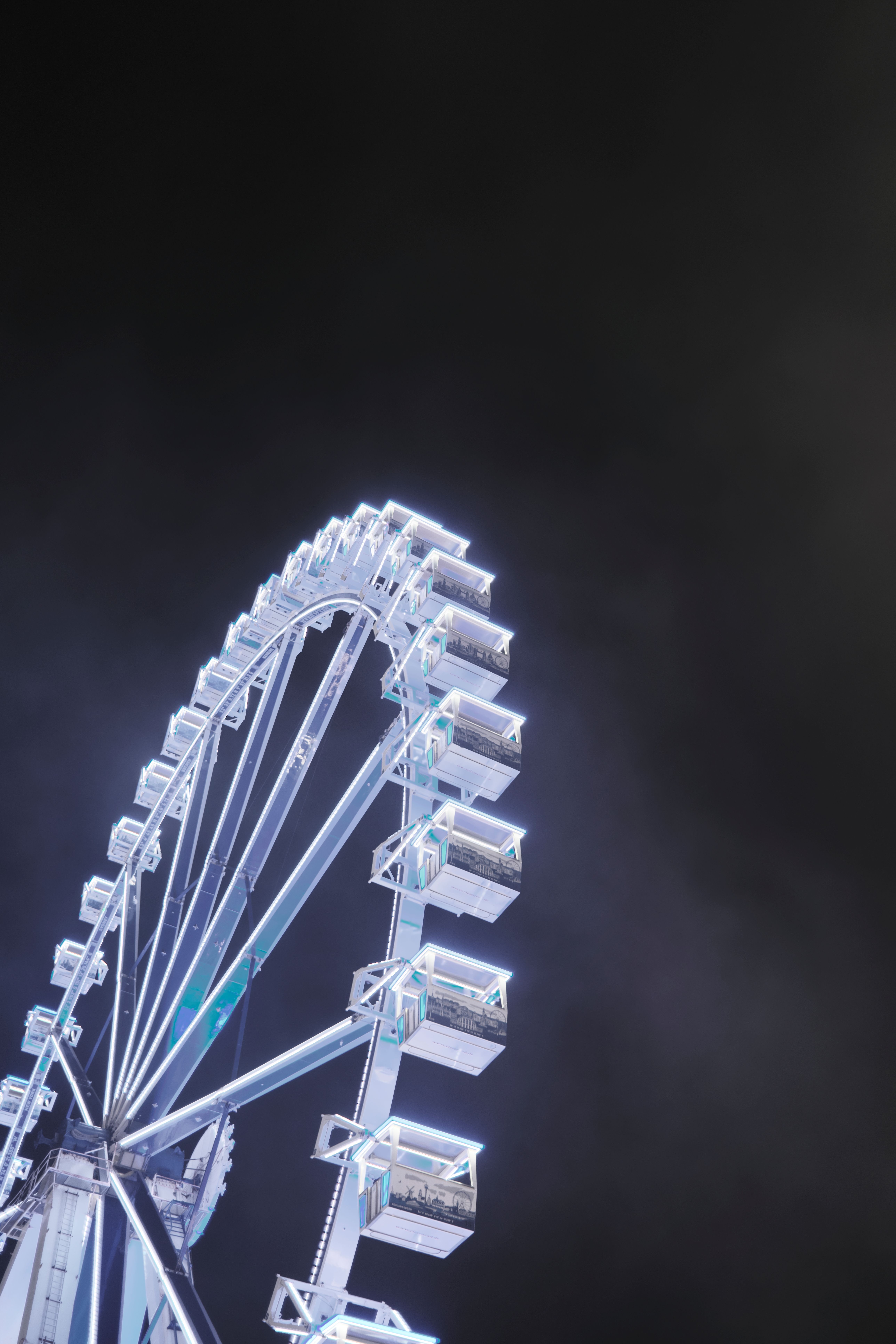 Glowing Ferris Wheel Against Night Sky · Free Stock Photo
