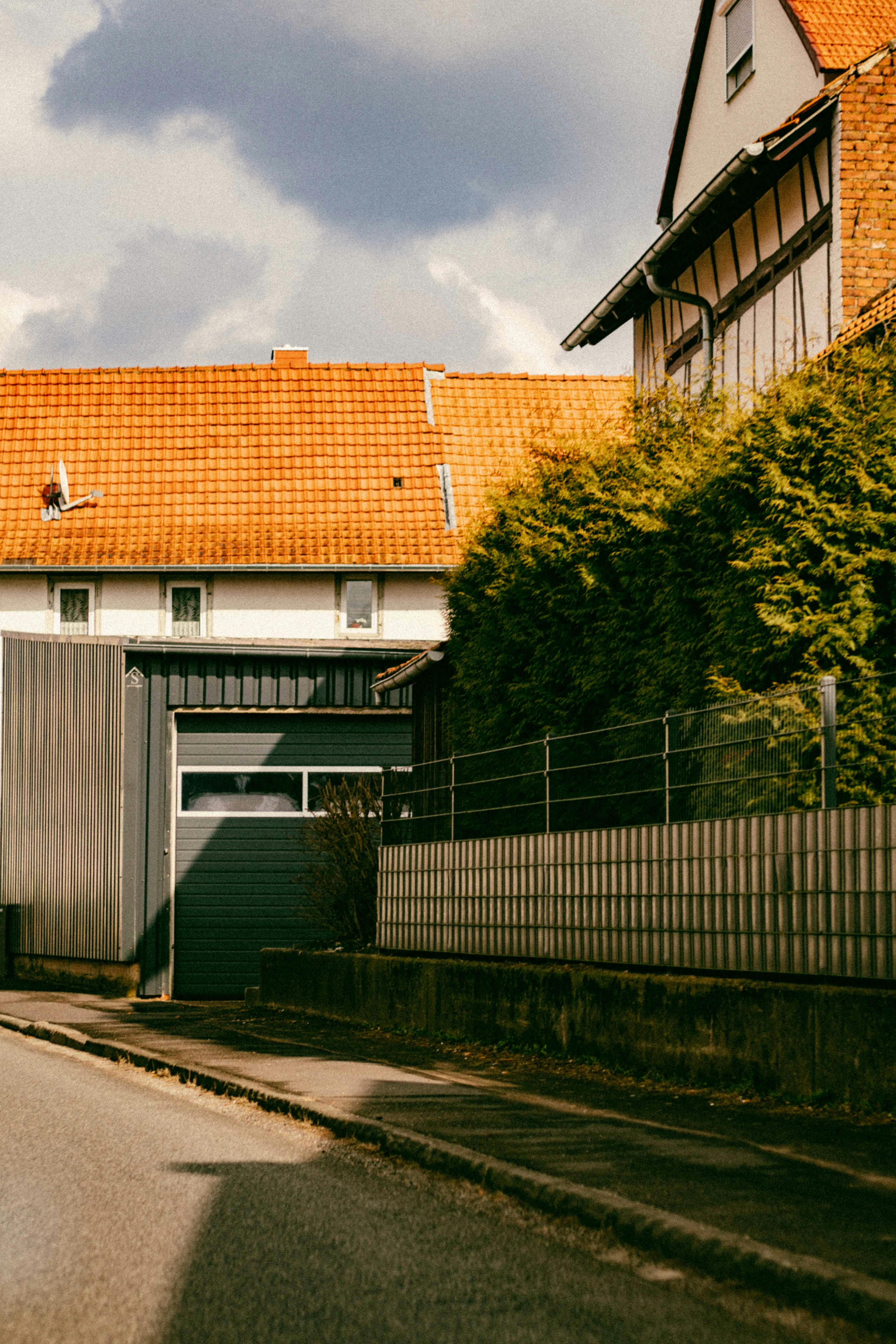 Charming German Village House with Red Roof · Free Stock Photo