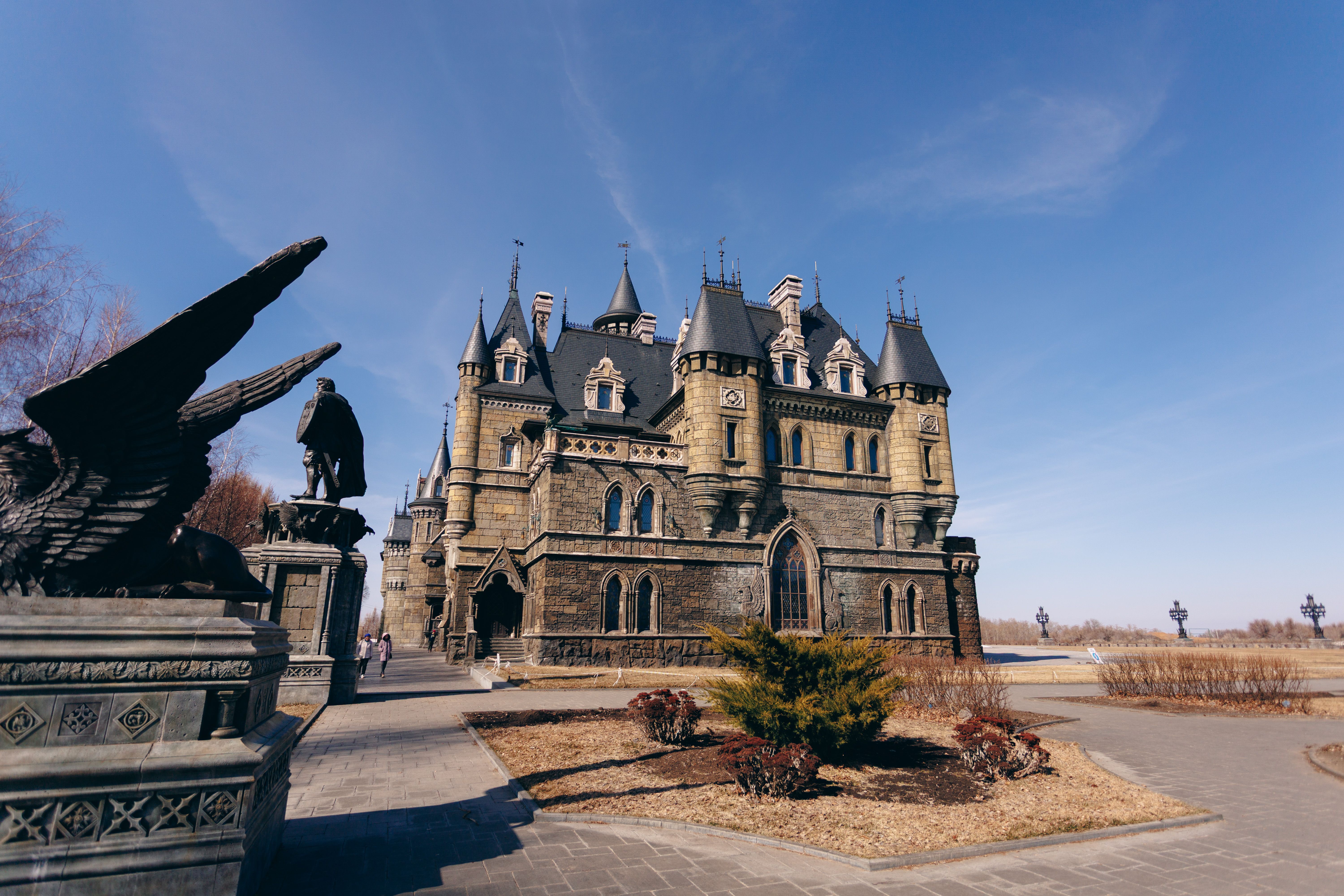 Majestic Gothic Revival Castle on a Clear Day · Free Stock Photo
