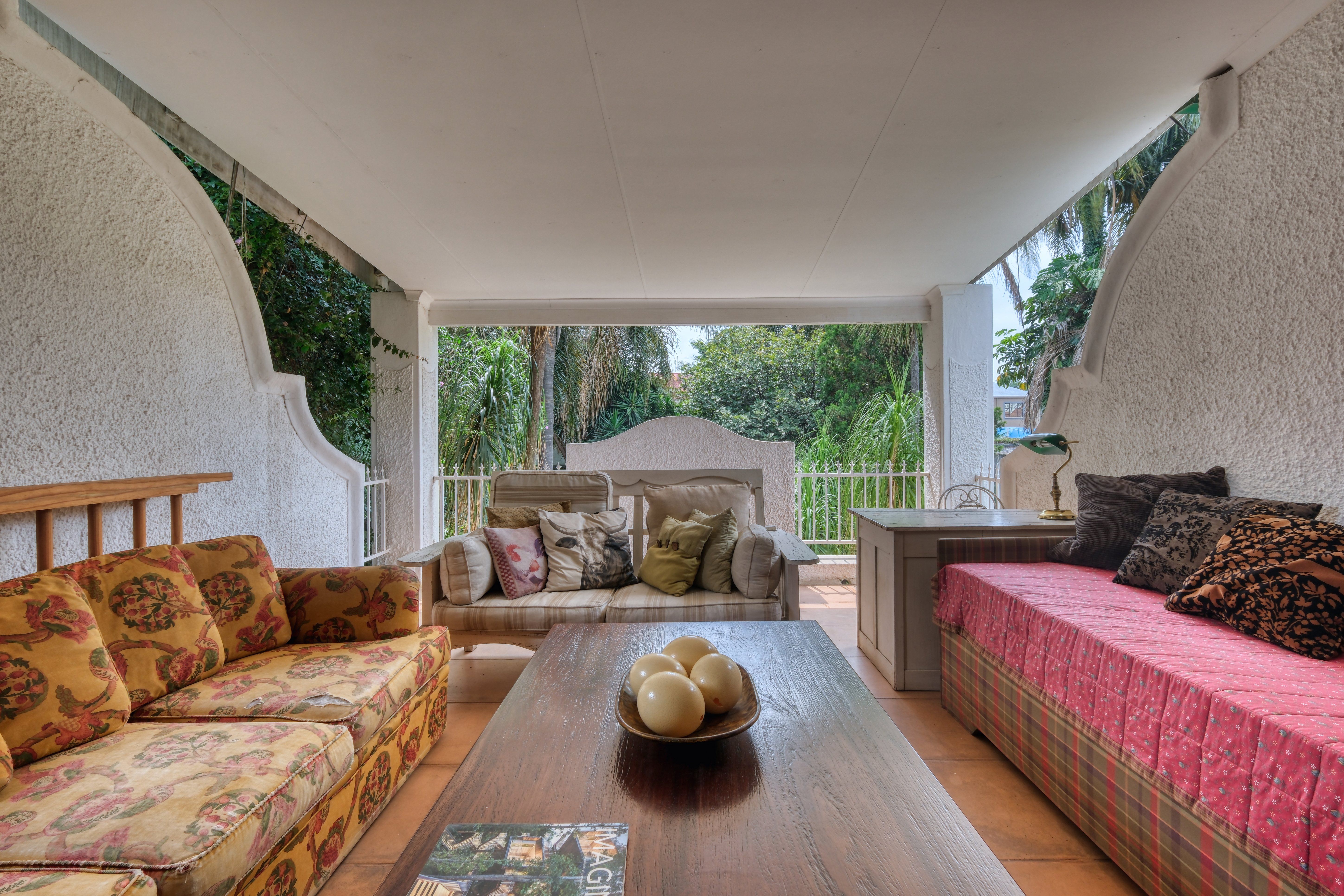 Cozy Outdoor Lounge Area with Comfortable Seating · Free Stock Photo