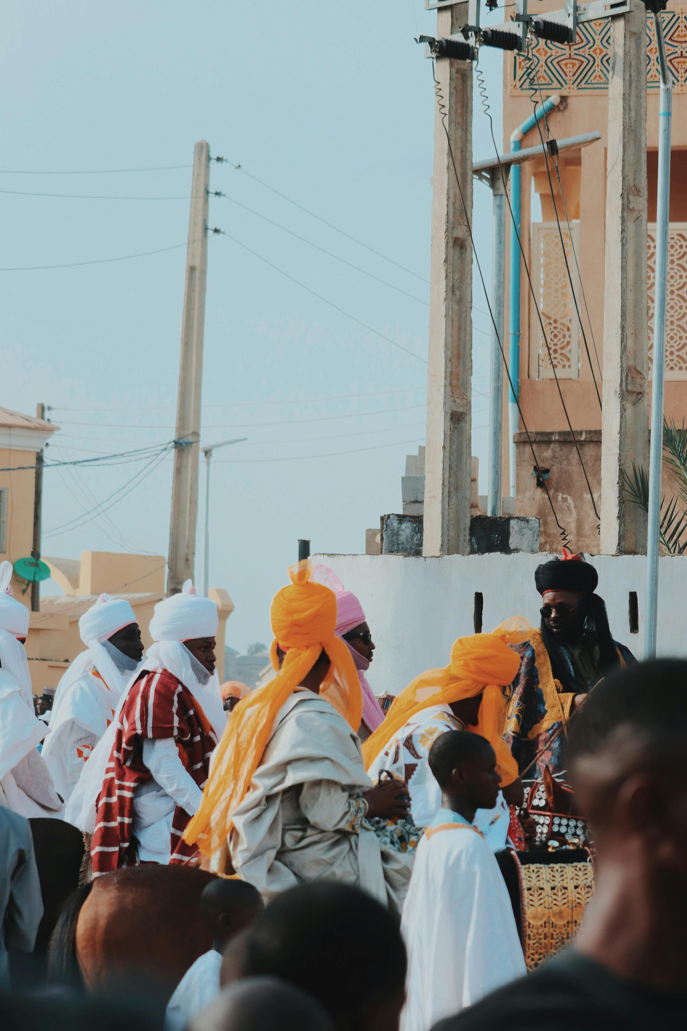 Colorful Traditional Procession with Cultural Attire · Free Stock Photo