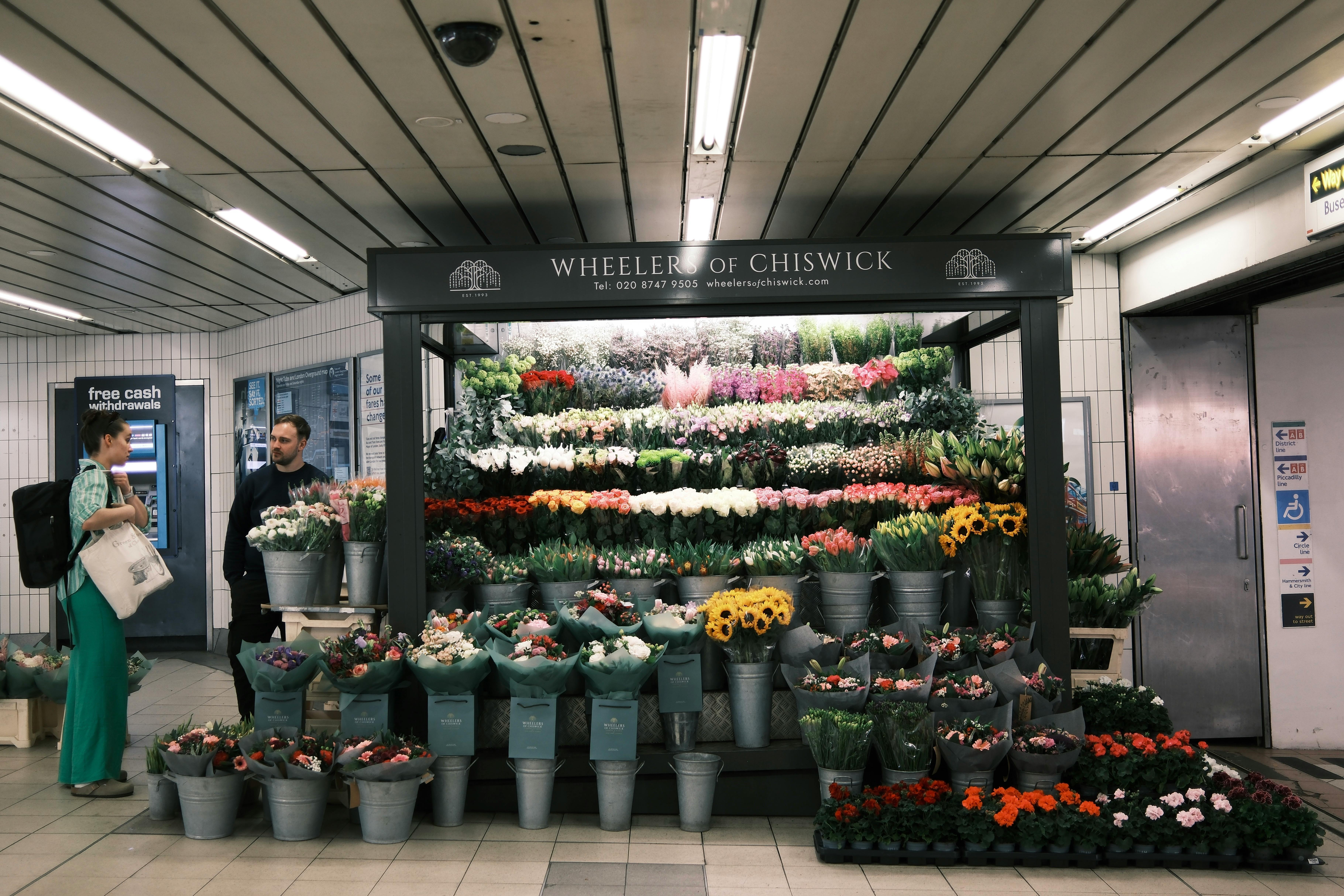 Chiswick Underground Flower Stall with Customers · Free Stock Photo