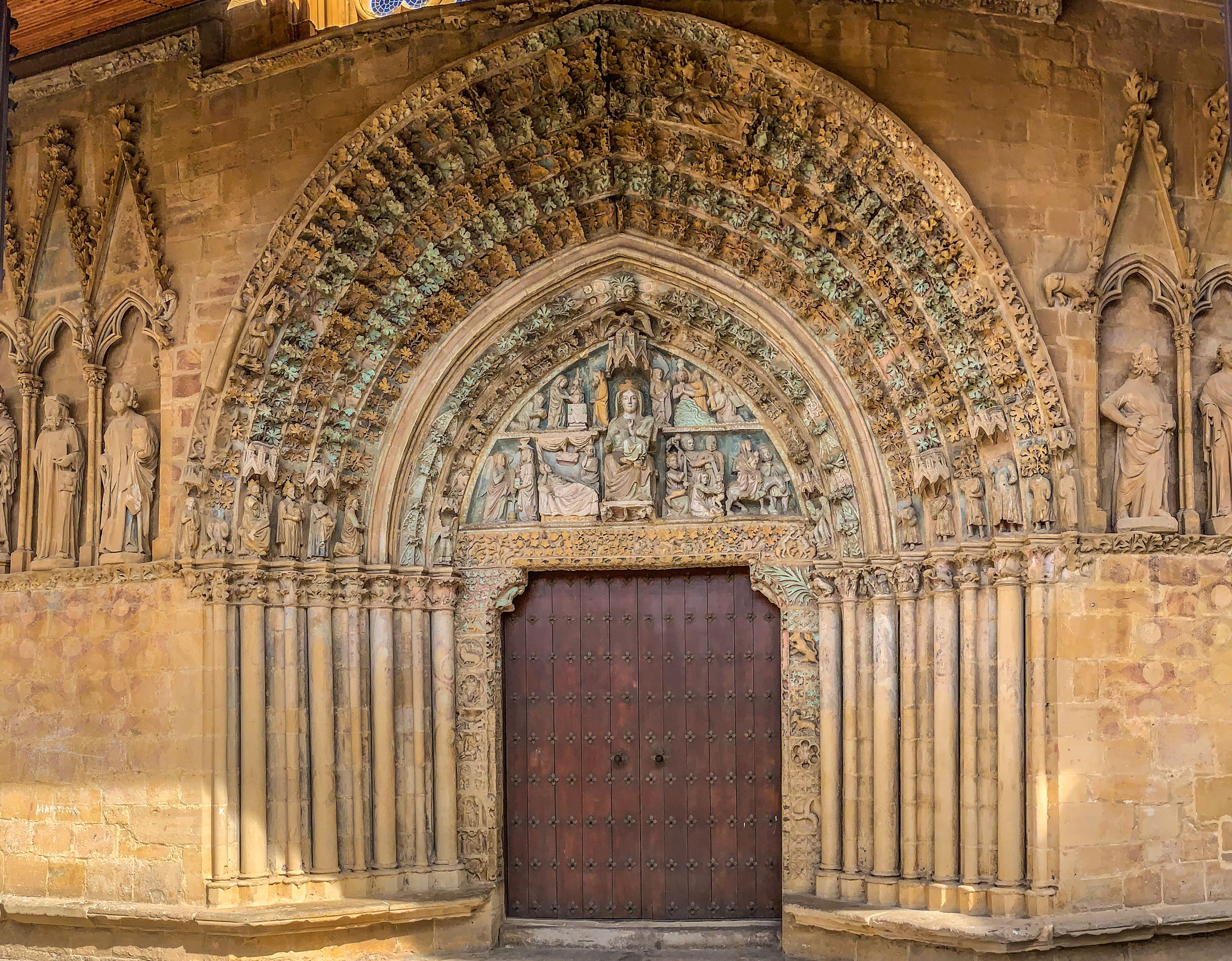 Detailed Gothic Church Entrance Architecture · Free Stock Photo