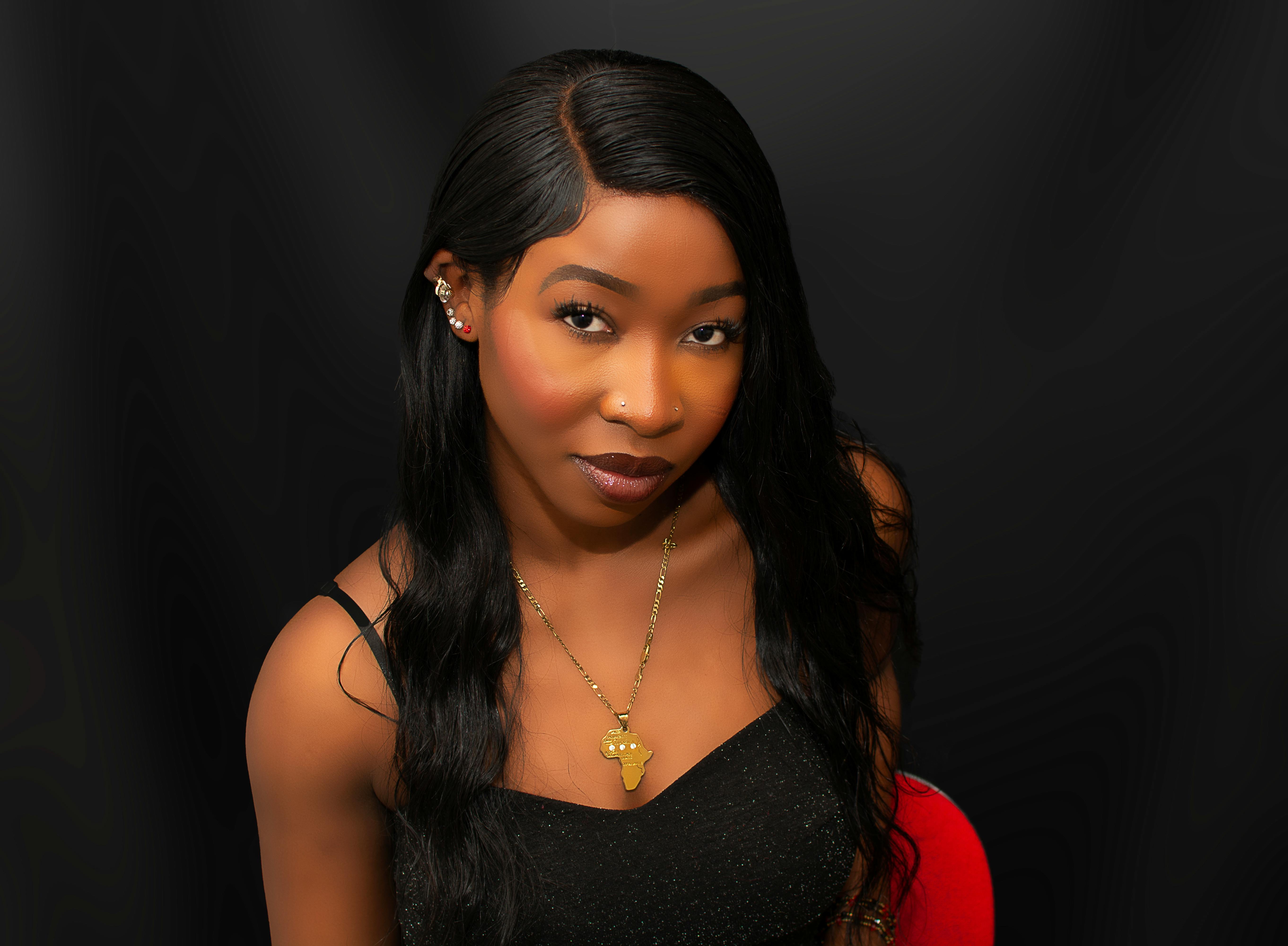 Elegant Portrait of Woman with Necklace · Free Stock Photo