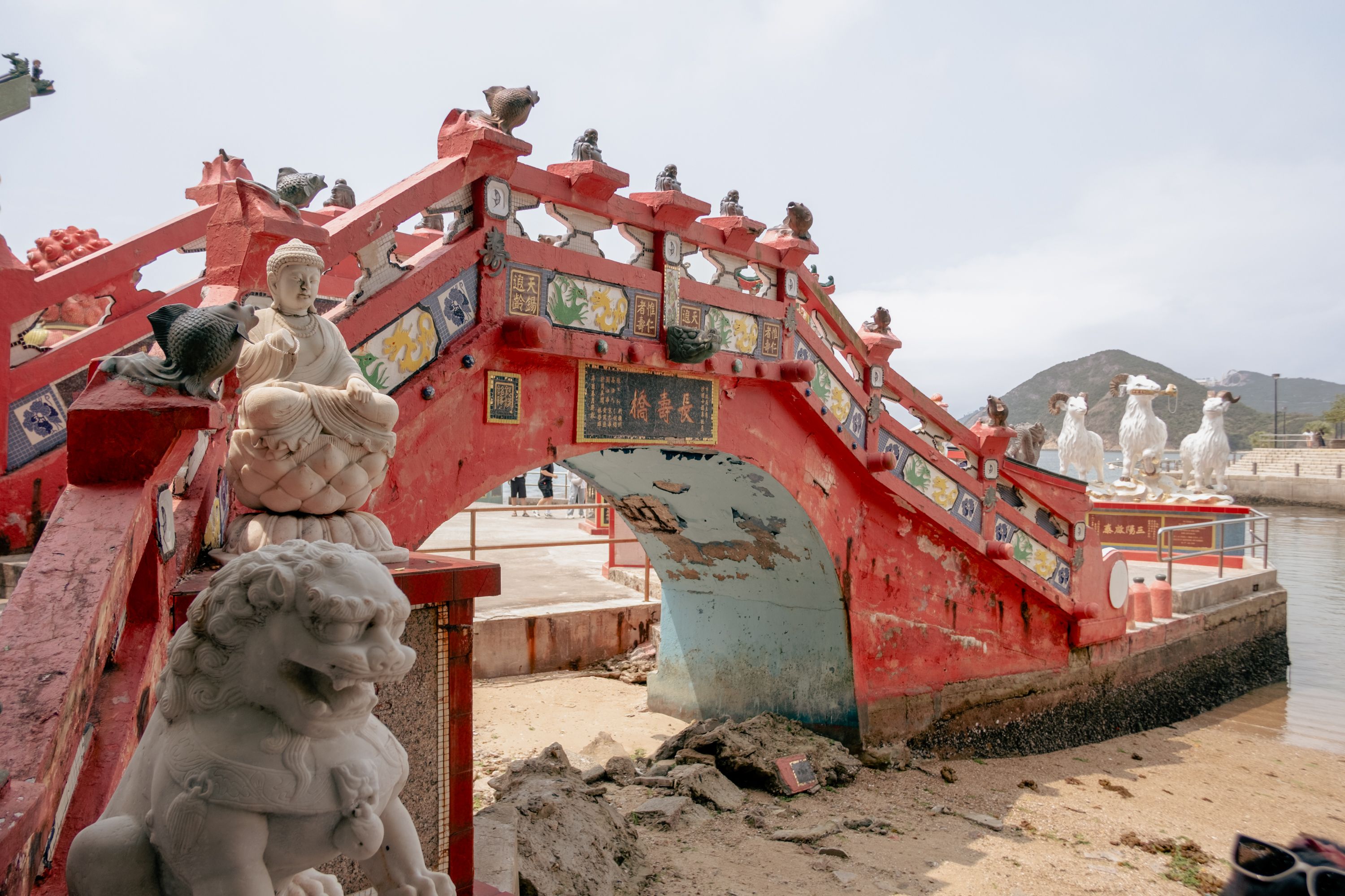 Colorful Red Bridge with Sculptures in Hong Kong · Free Stock Photo