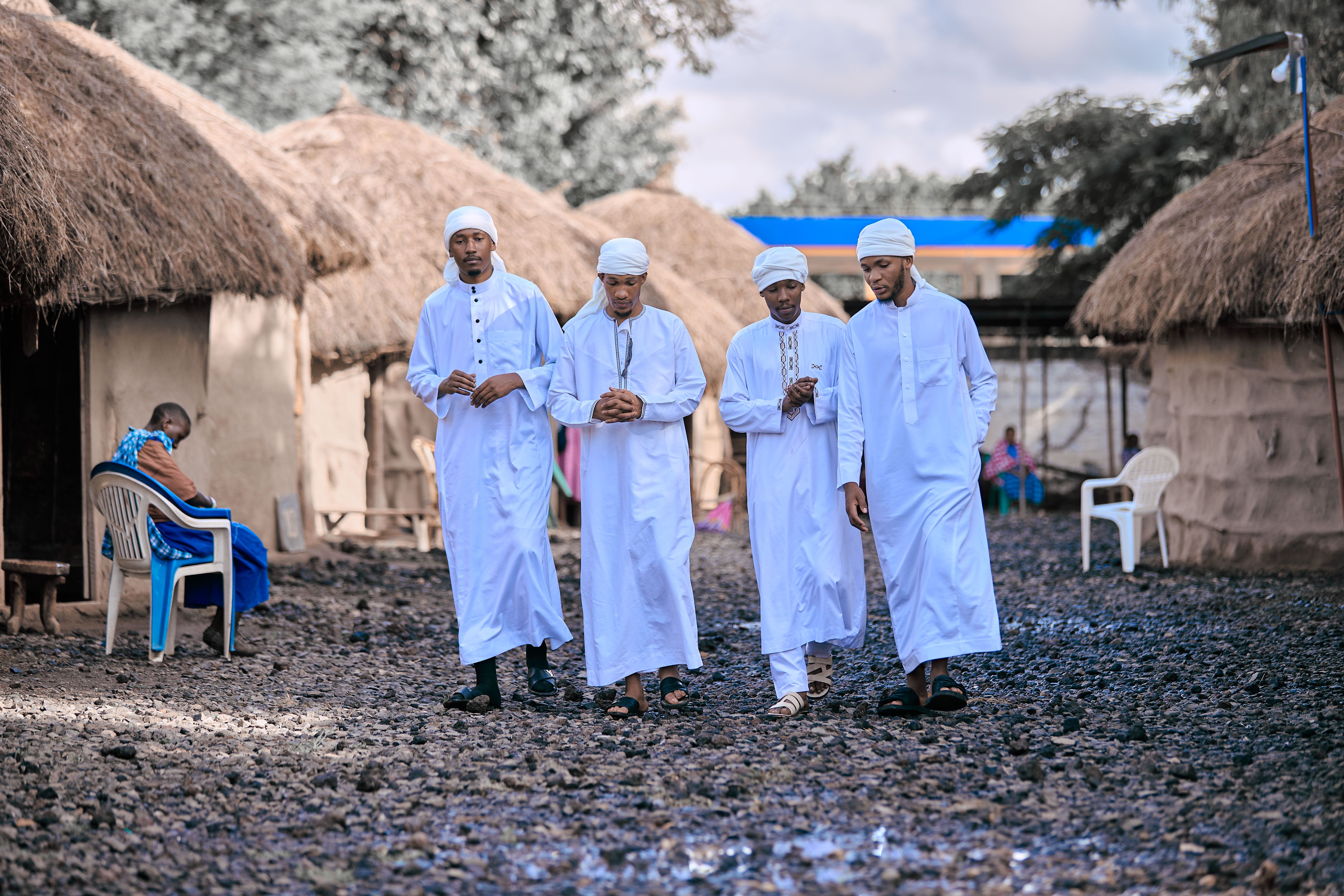 Traditional Middle Eastern Men in Rural Village Setting · Free Stock Photo