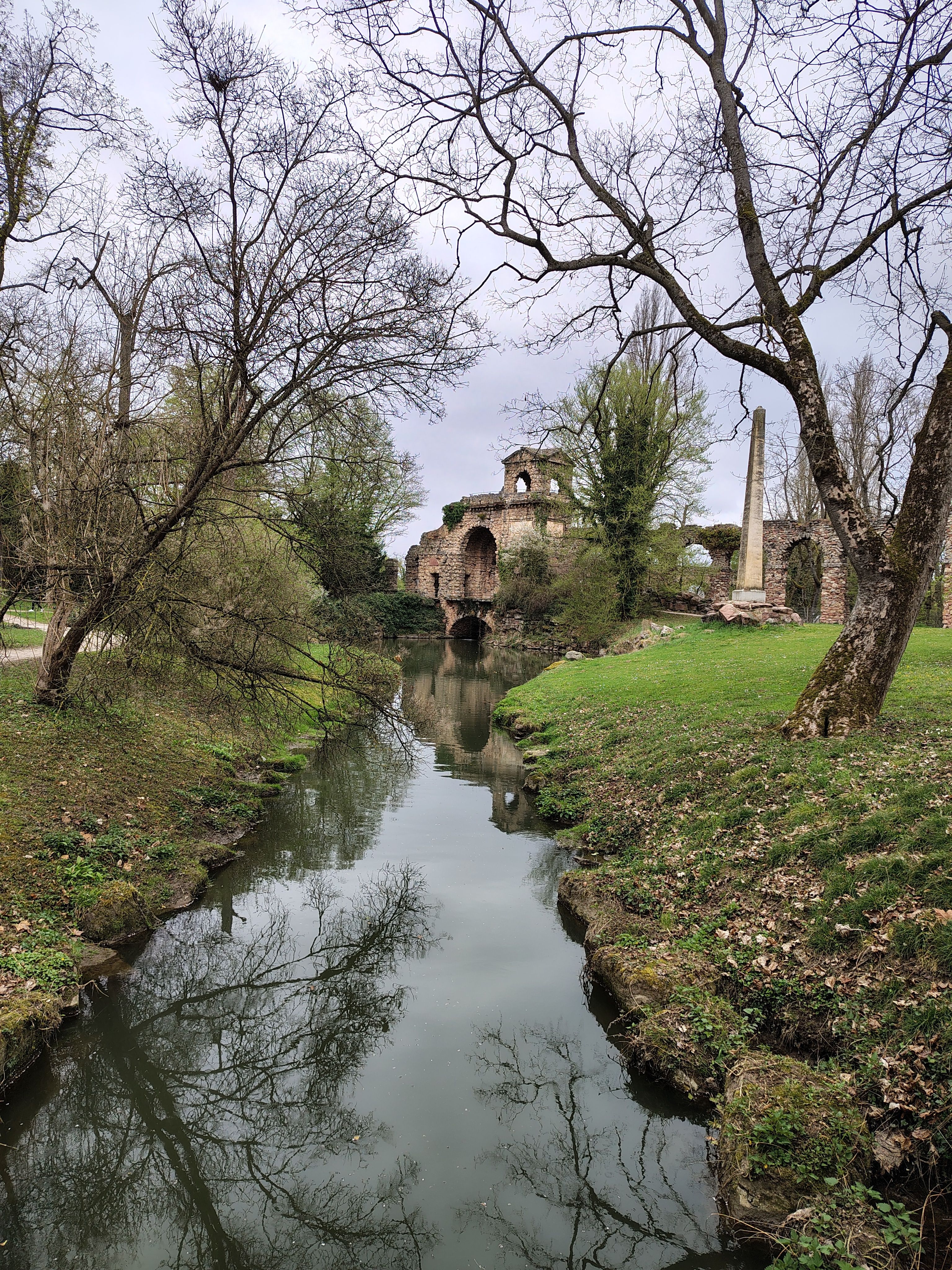Scenic Ruins by a Serene Brook in Spring · Free Stock Photo