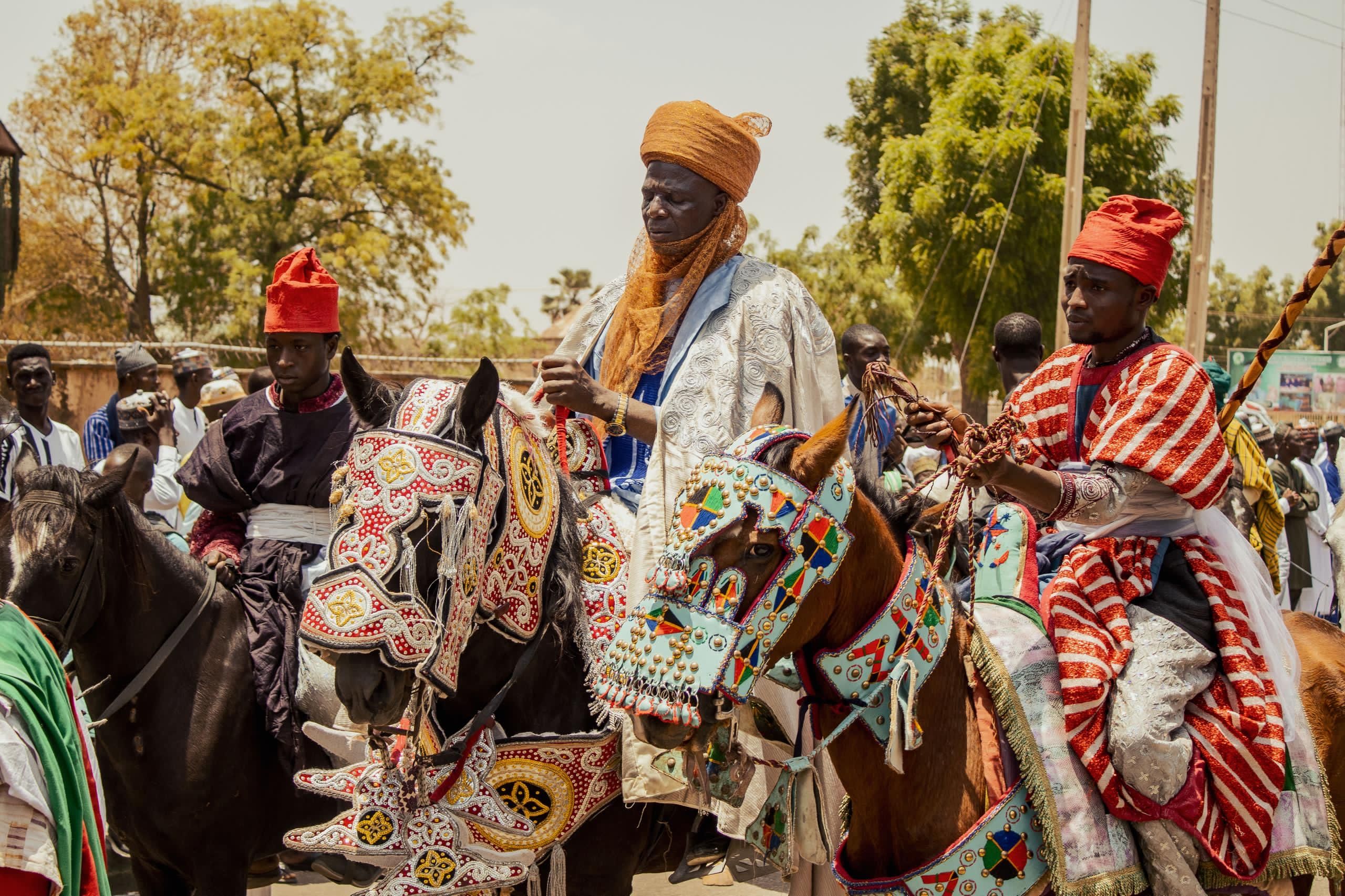 Colorful Cultural Horse Parade with Riders · Free Stock Photo