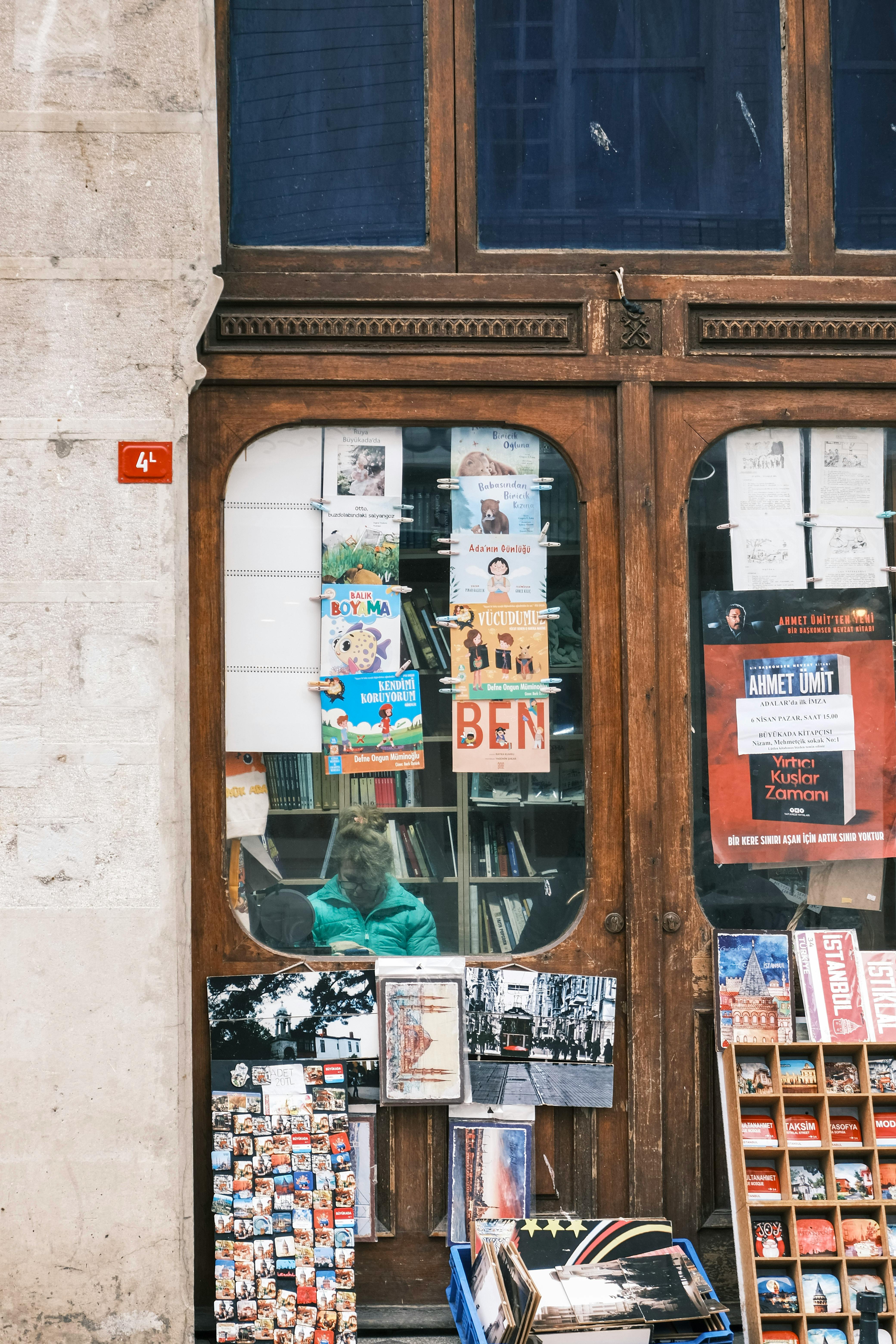 Vintage Bookstore Front with Displayed Books · Free Stock Photo