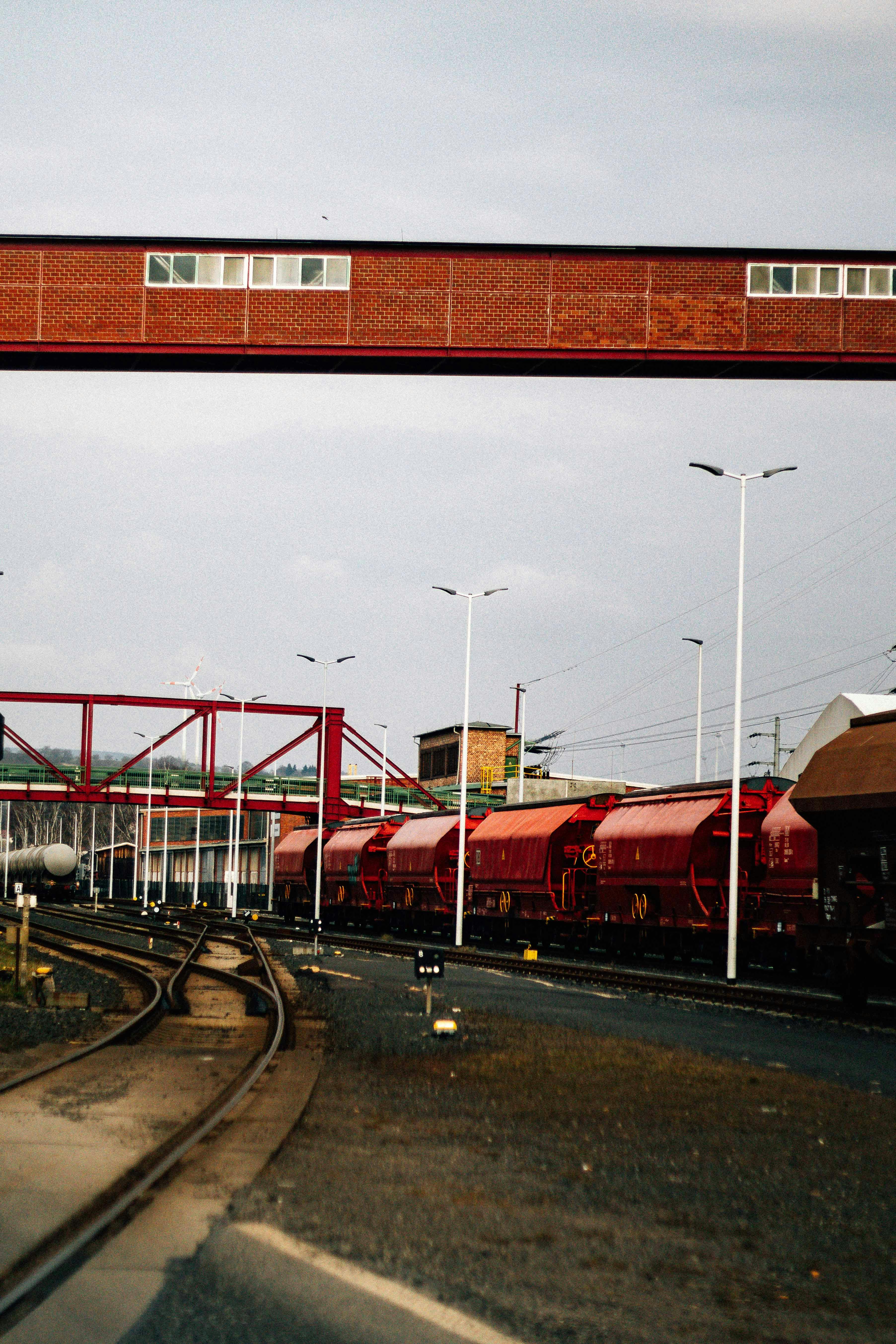 Red Freight Trains on Railroad Tracks · Free Stock Photo