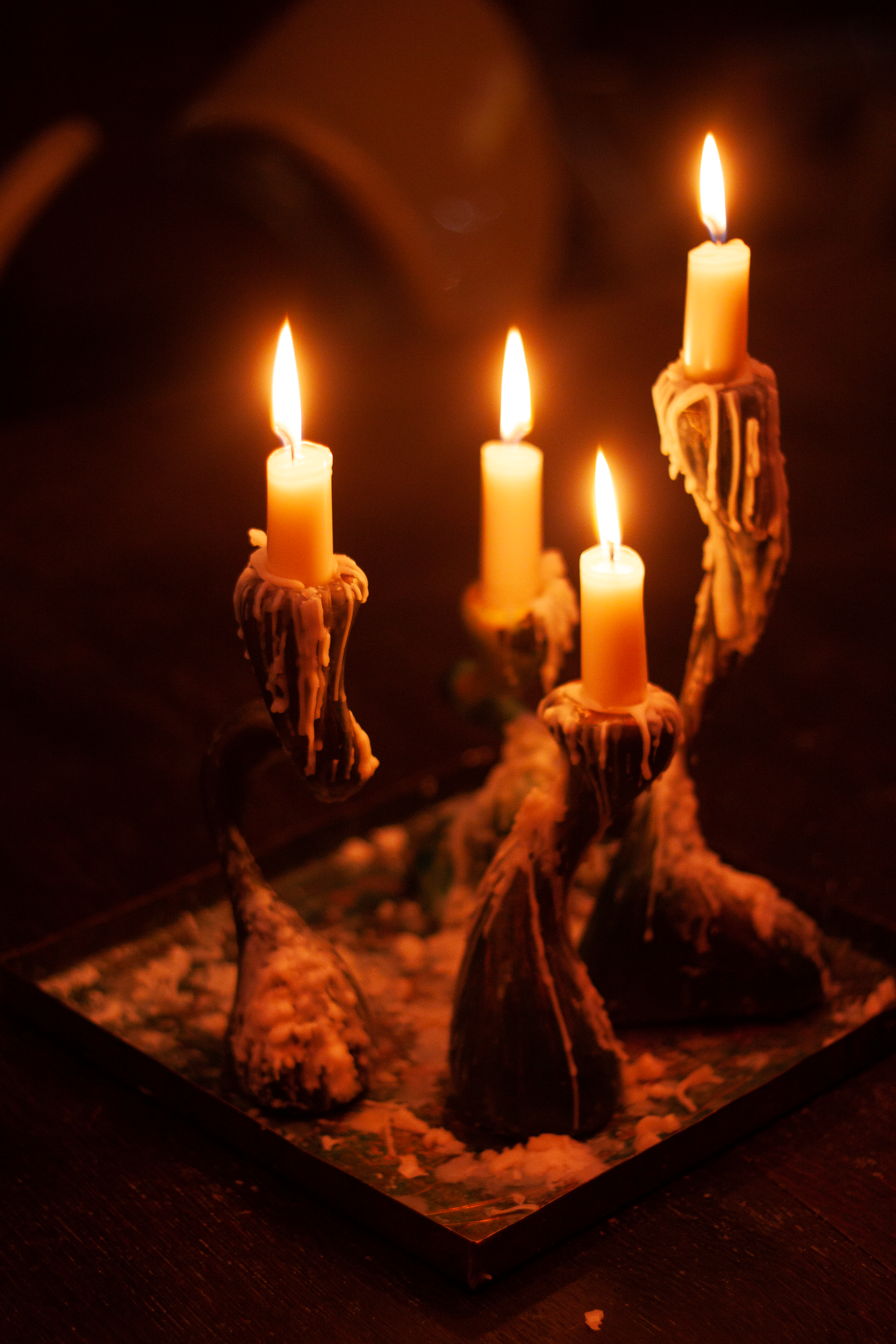 Cozy Candlelit Ambiance with Rustic Candlesticks · Free Stock Photo