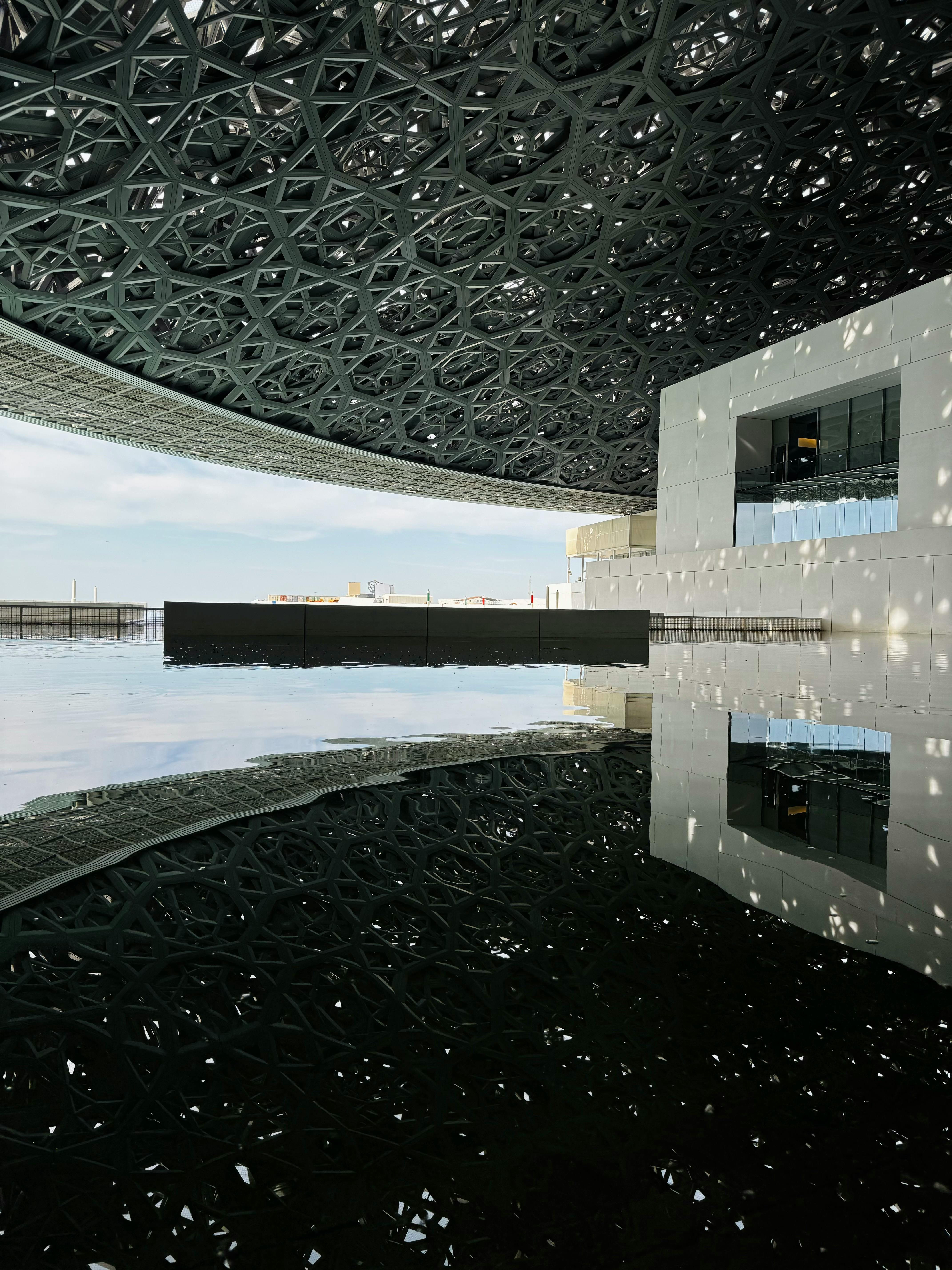 Architectural Reflection at Louvre Abu Dhabi · Free Stock Photo