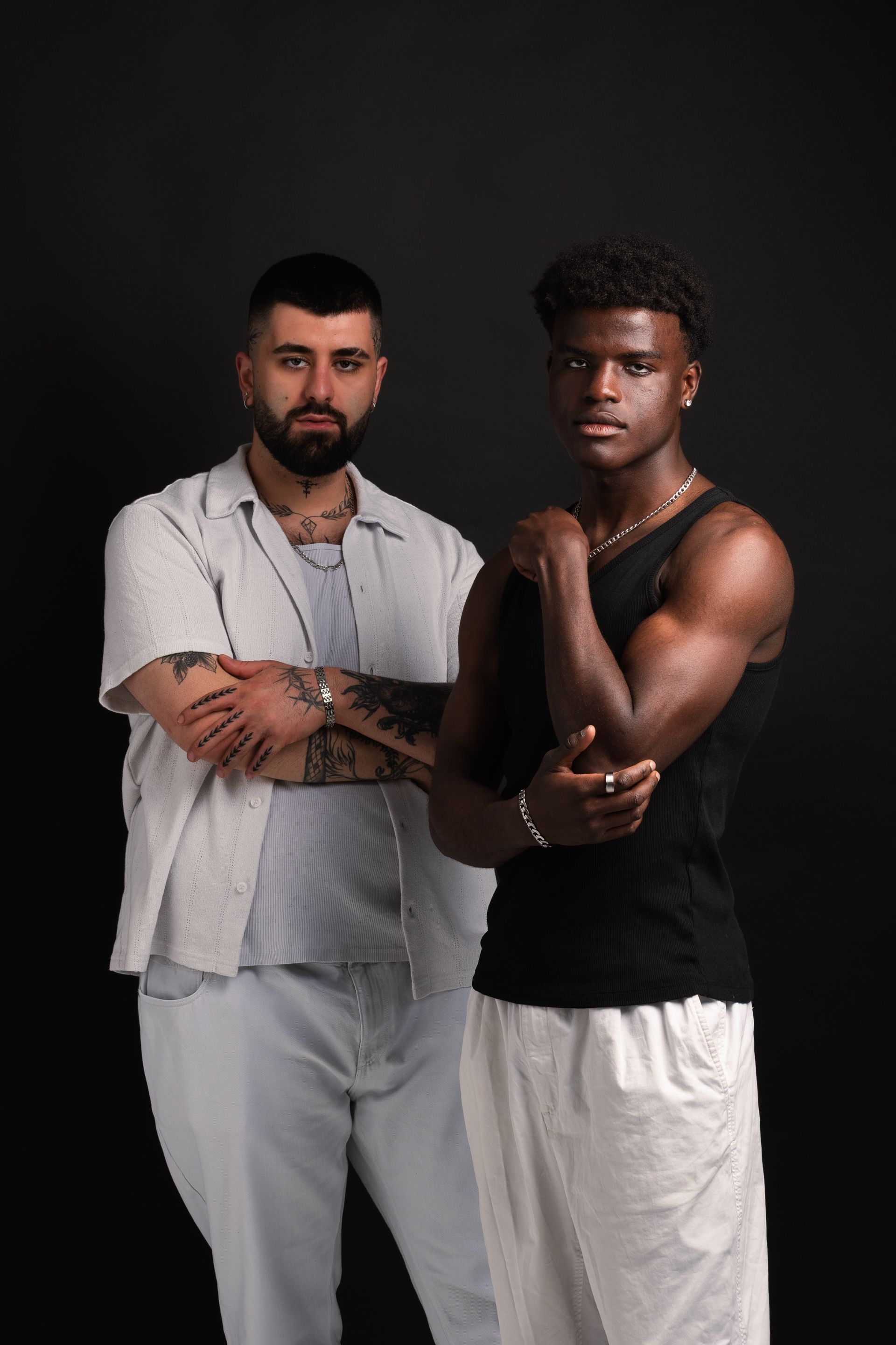 Stylish Male Duo Posing in Studio Portrait · Free Stock Photo