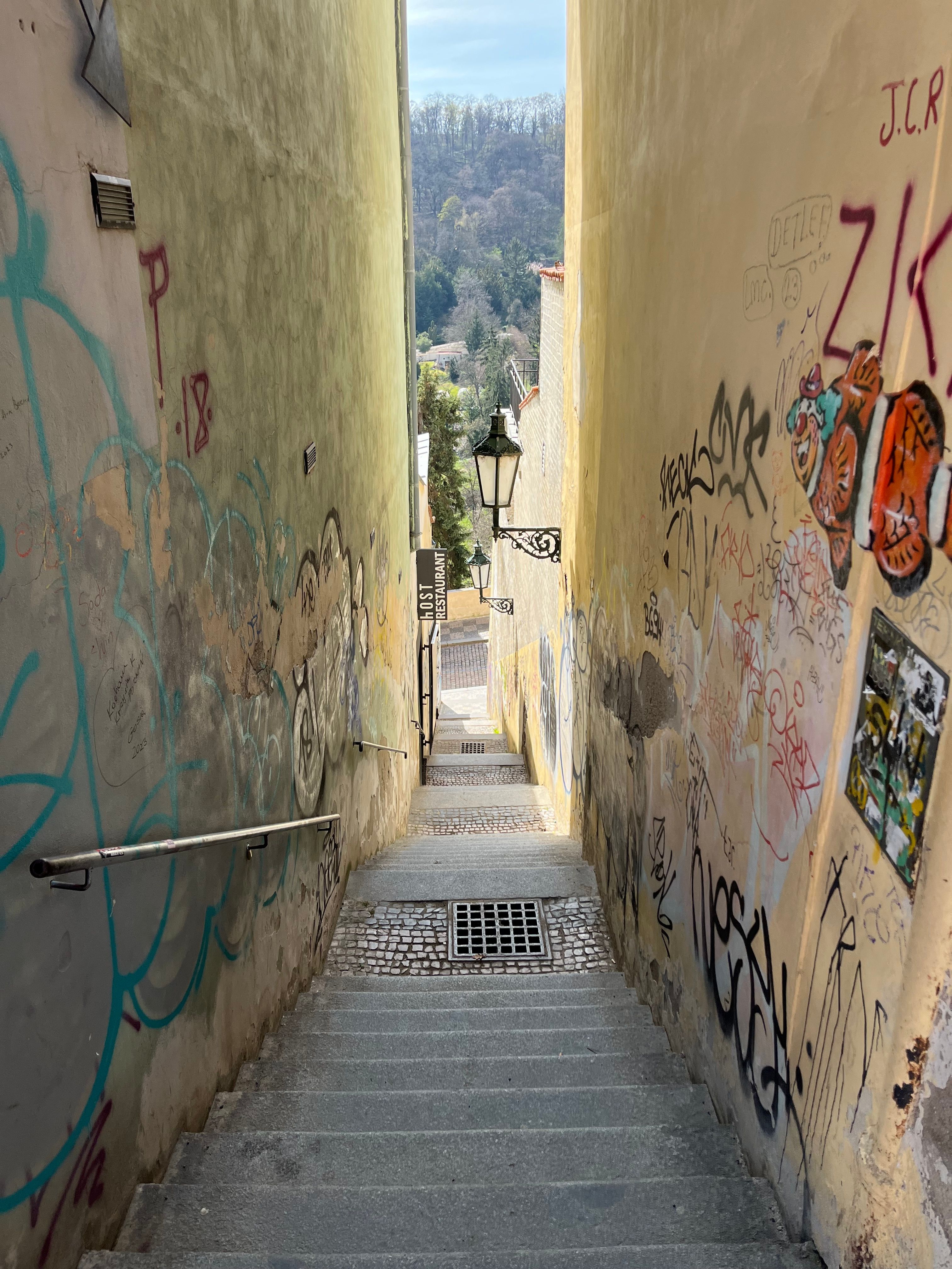 Narrow Graffiti-Covered Alley in Prague · Free Stock Photo