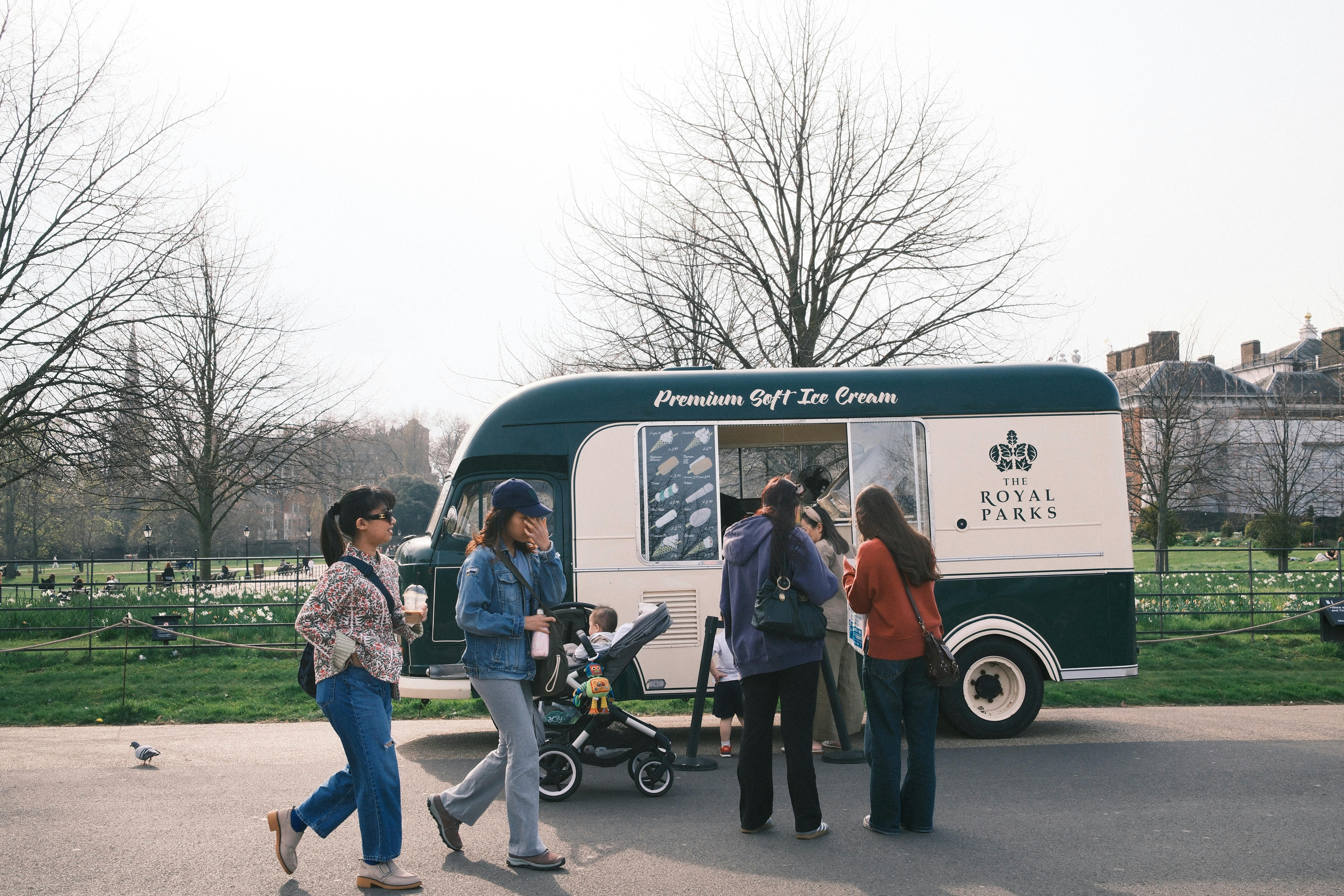 People Enjoying Ice Cream at Park in Springtime · Free Stock Photo