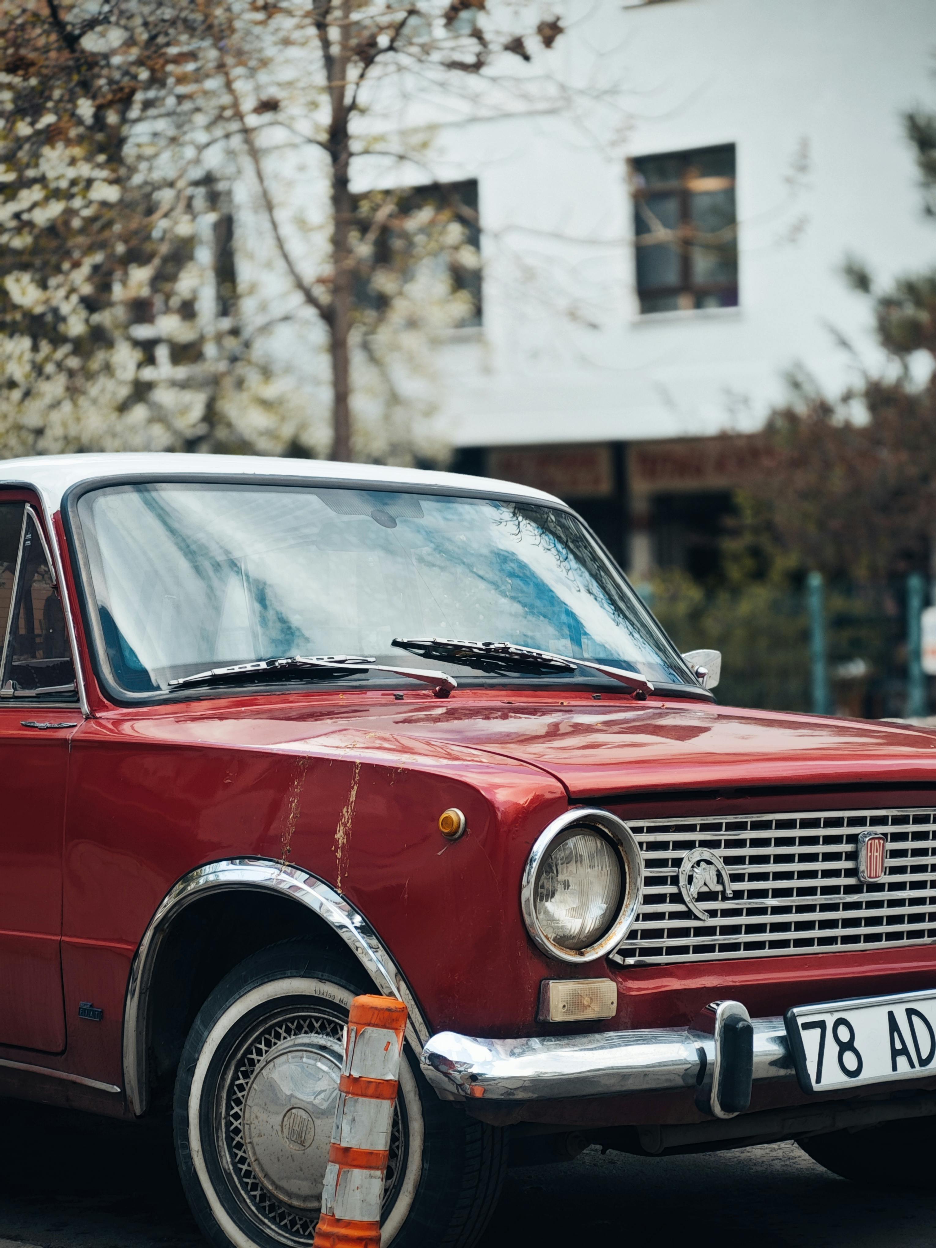 Vintage Red Car Parked on Street in Spring · Free Stock Photo