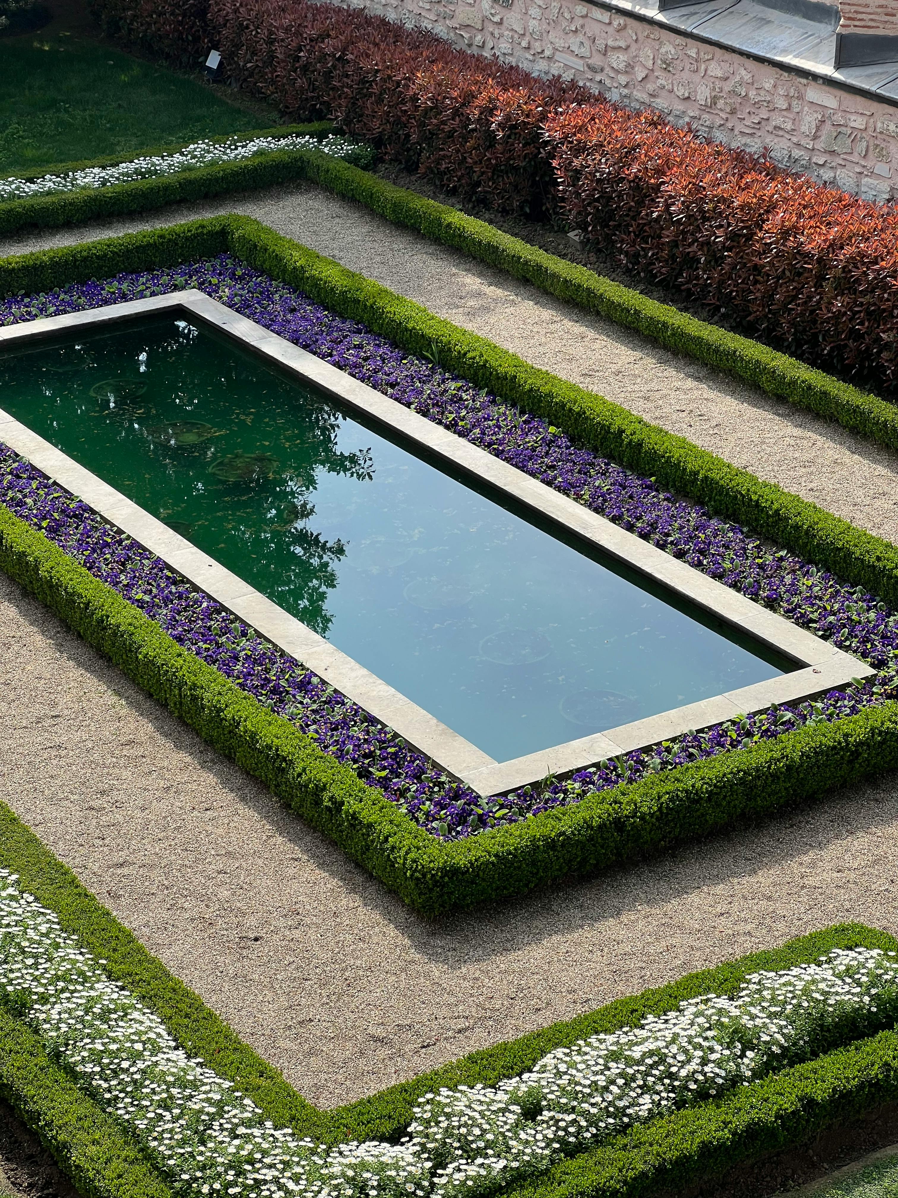 Elegant Rectangular Reflecting Pool in Garden · Free Stock Photo