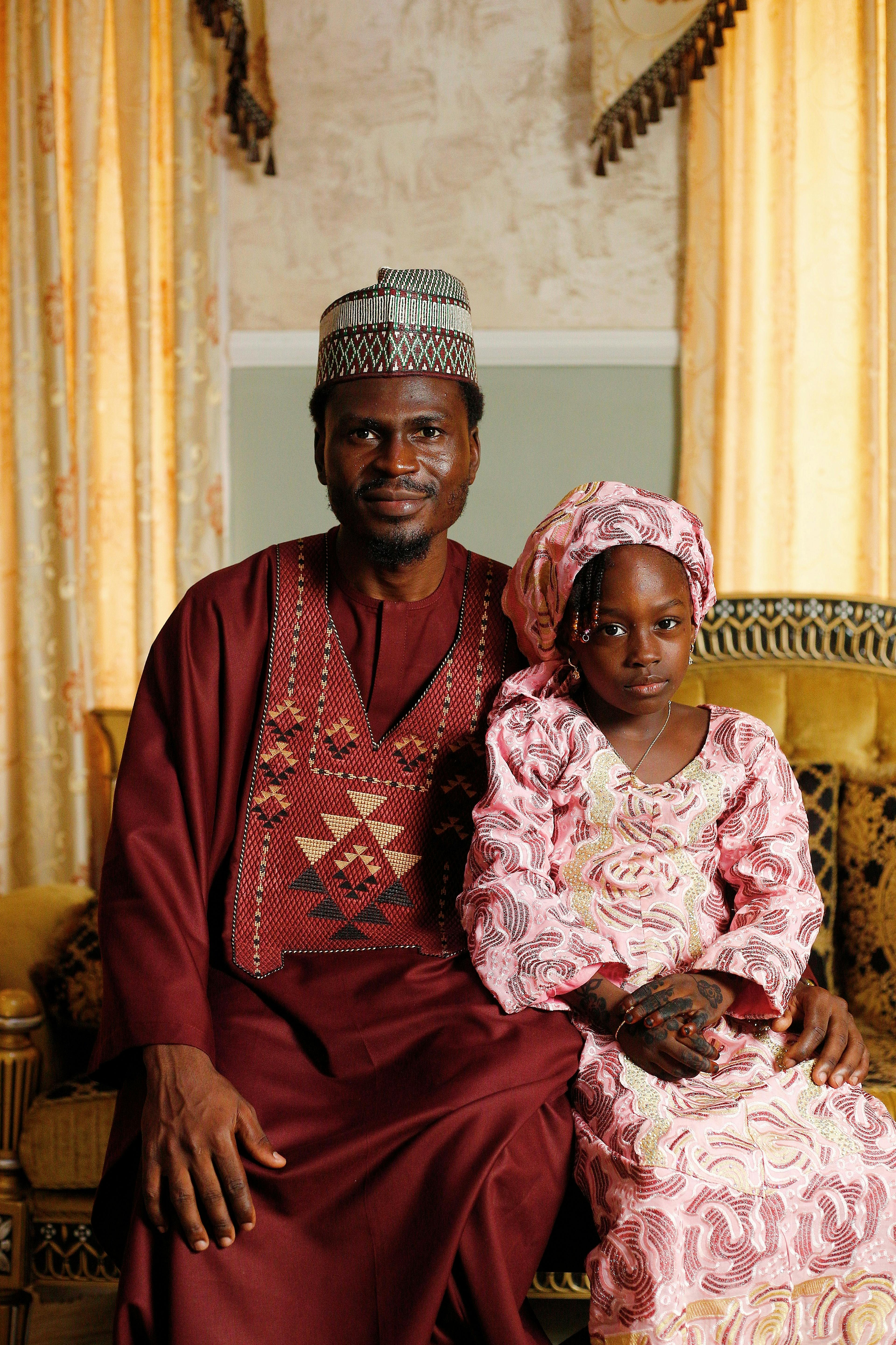 Father and Daughter in Traditional Nigerian Attire · Free Stock Photo
