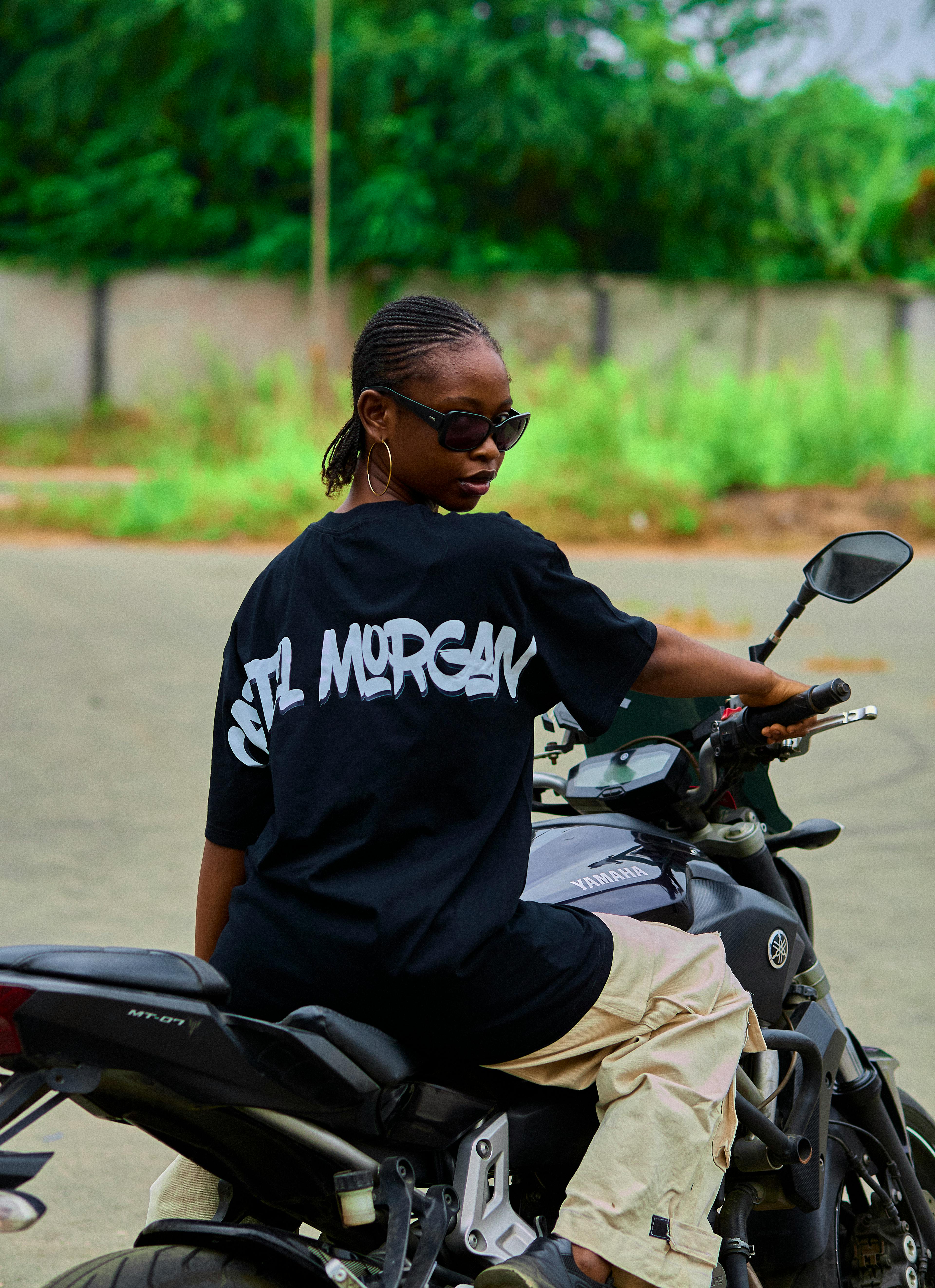 Fashionable Woman Riding Motorcycle in Lagos · Free Stock Photo