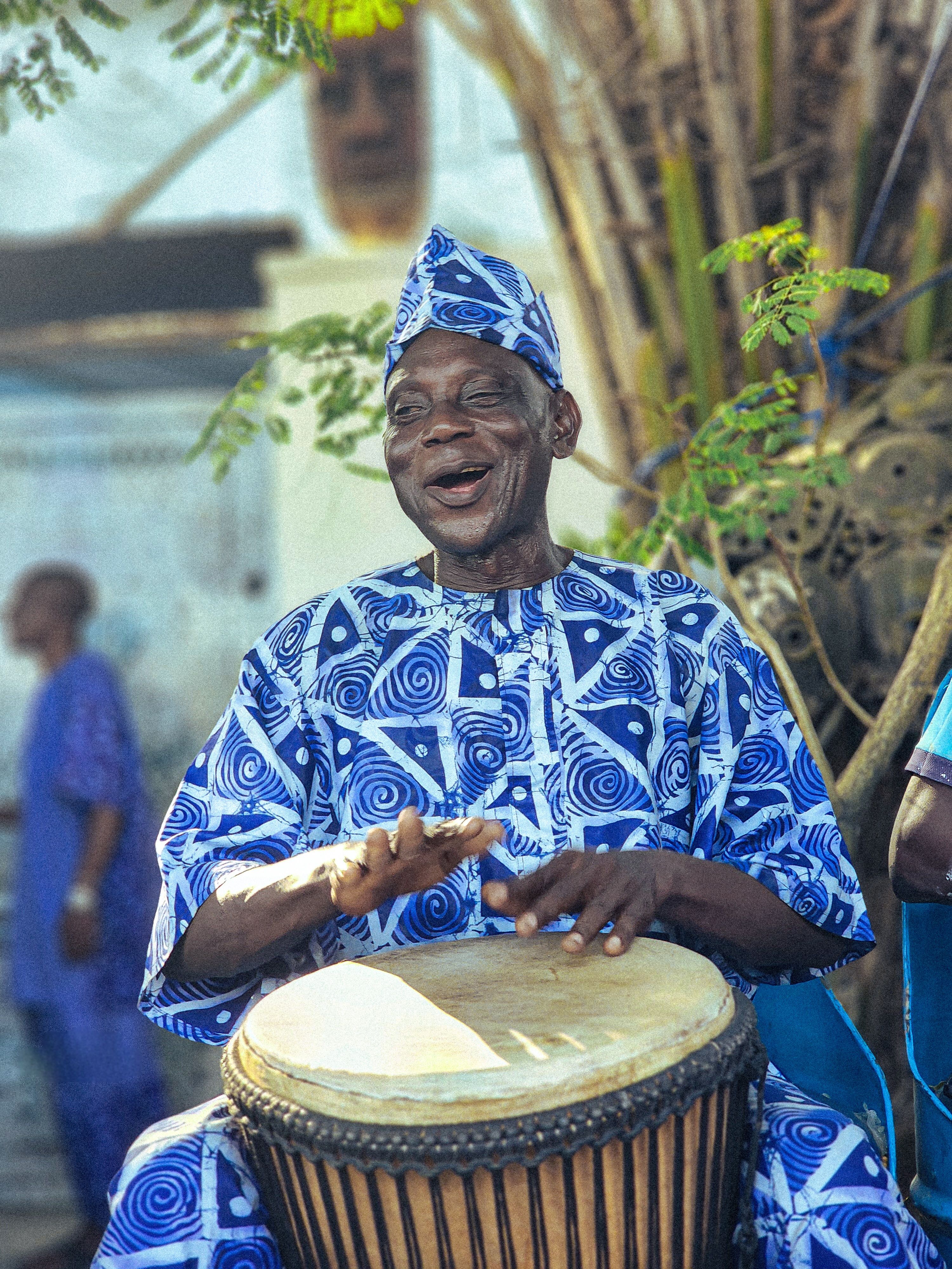 Traditional African Drummer Playing Djembe · Free Stock Photo