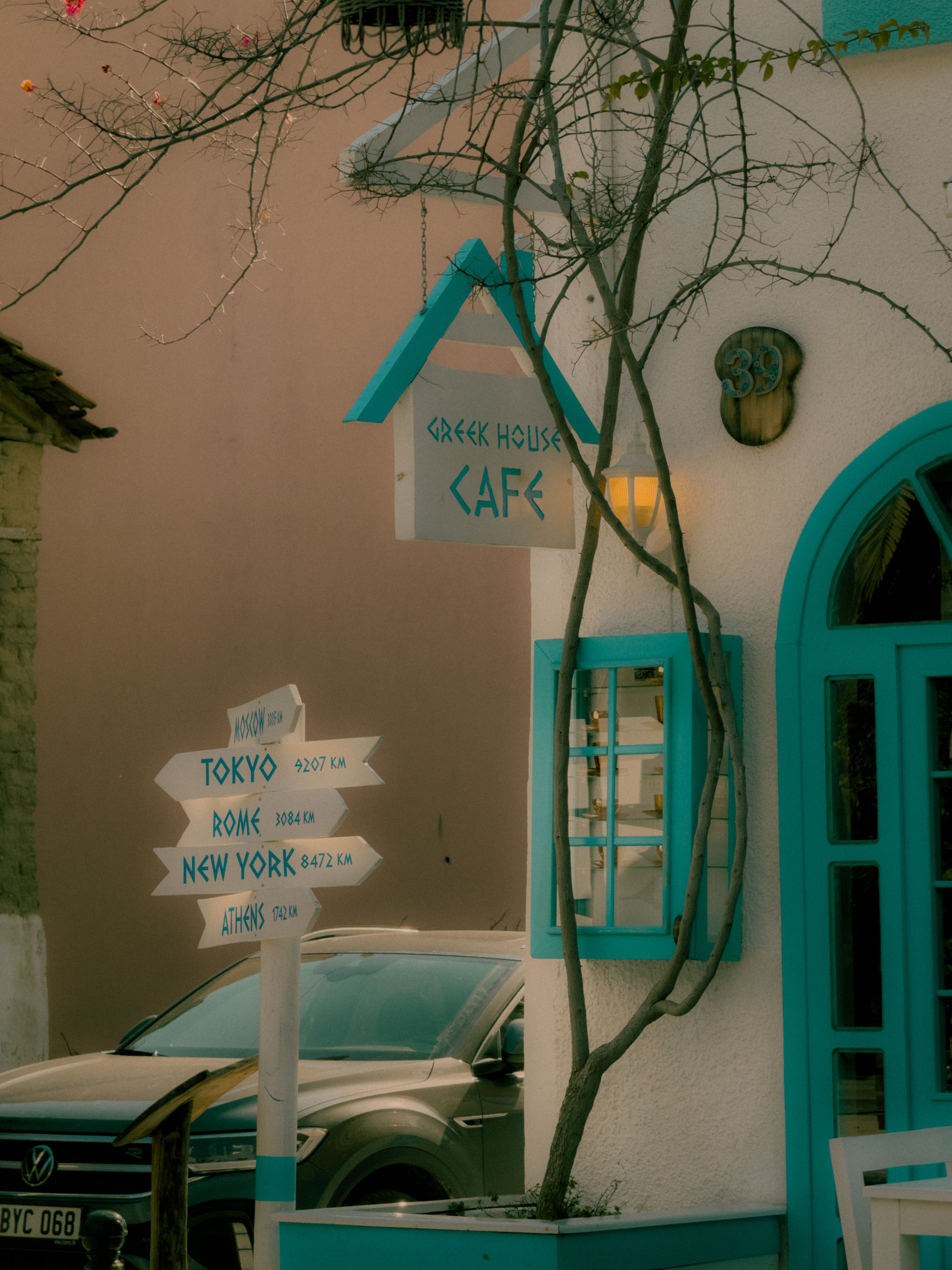 Charming Greek House Café in Antalya Street Scene · Free Stock Photo