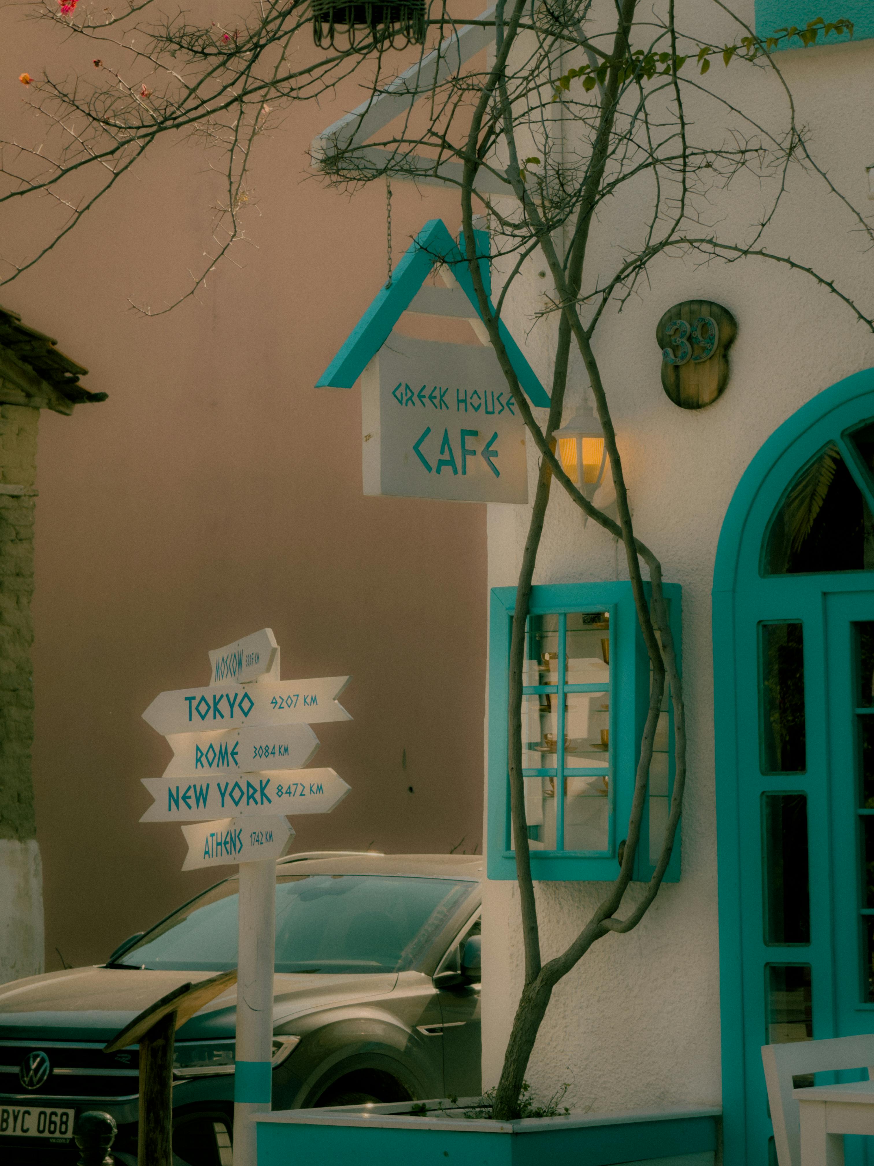 Charming Greek House Café in Antalya Street Scene · Free Stock Photo