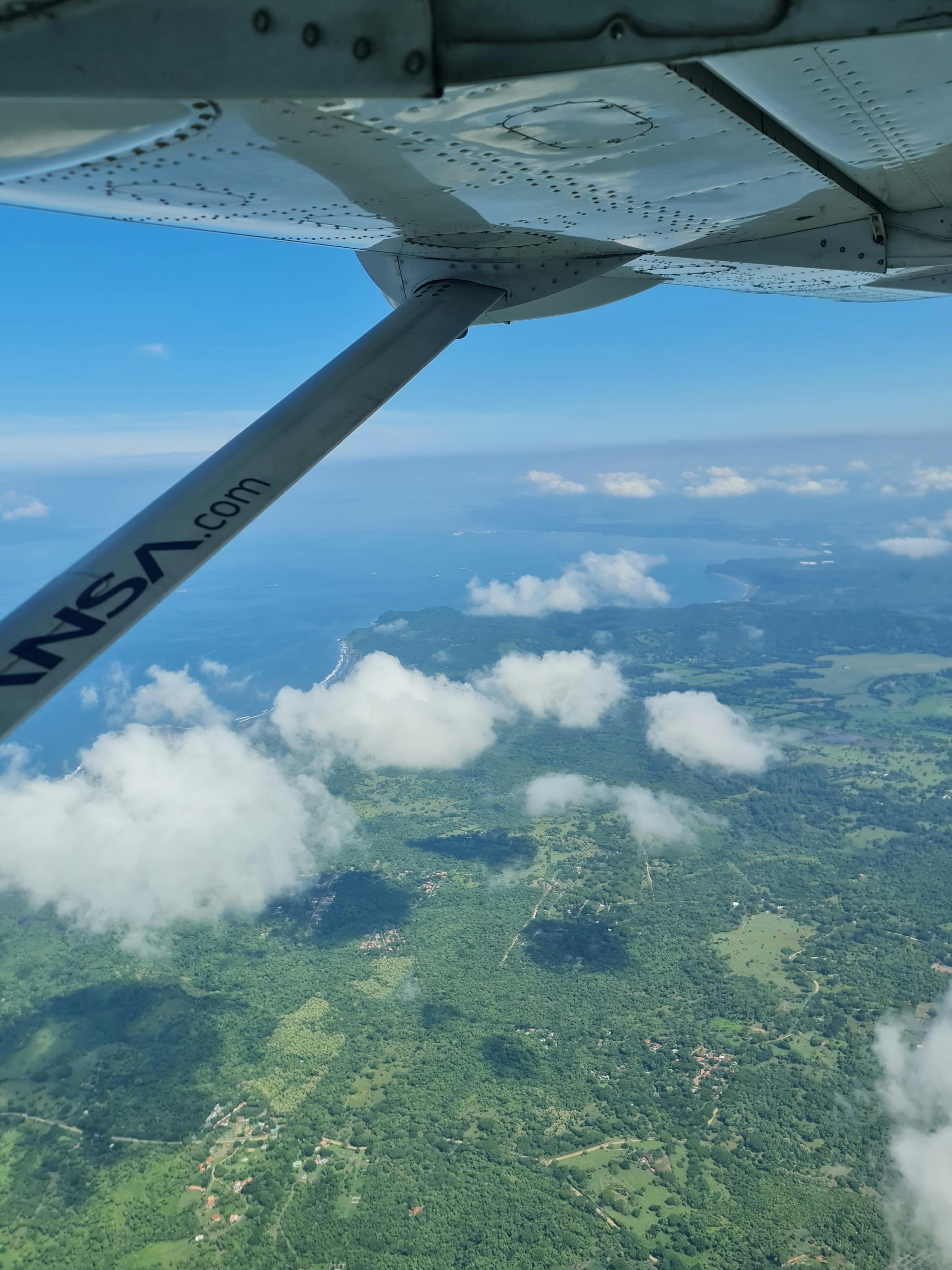 Aerial View of Lush Costa Rica Coastline from Plane · Free Stock Photo