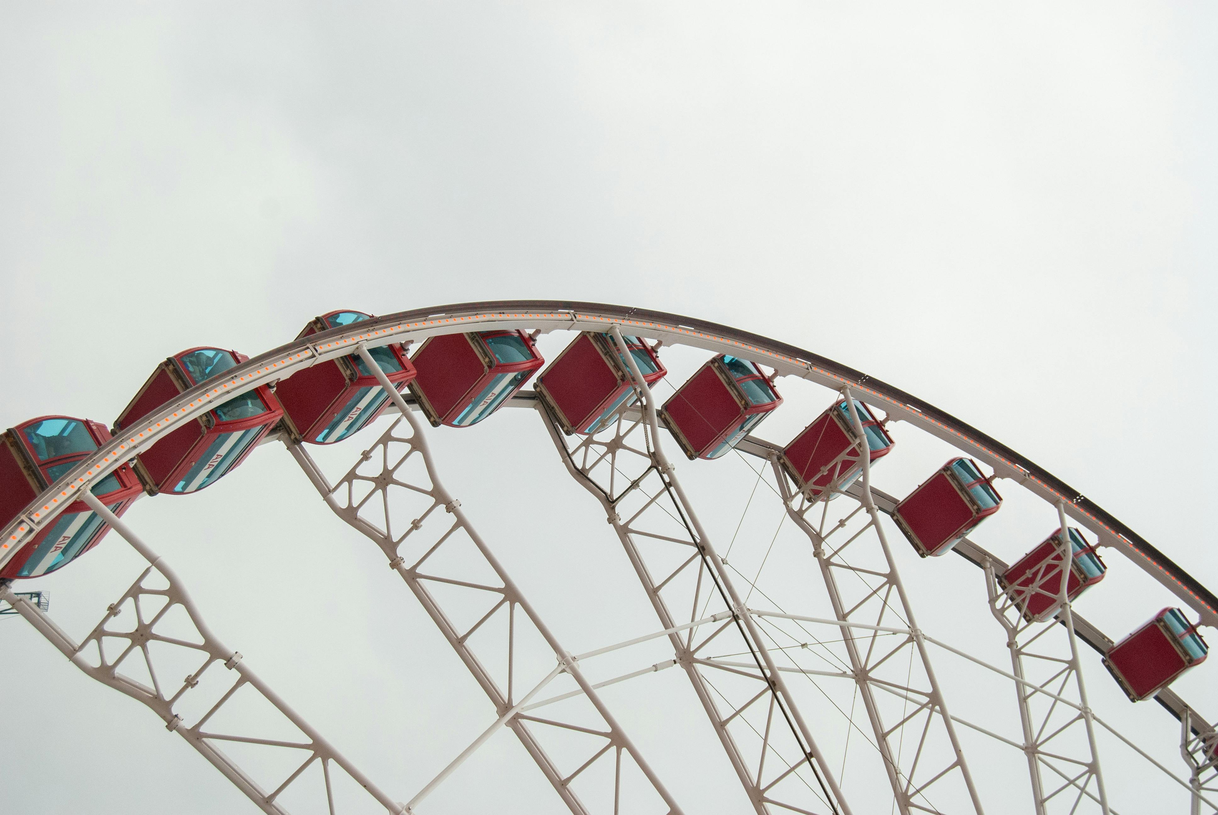 Red Ferris Wheel Against Clear Sky · Free Stock Photo