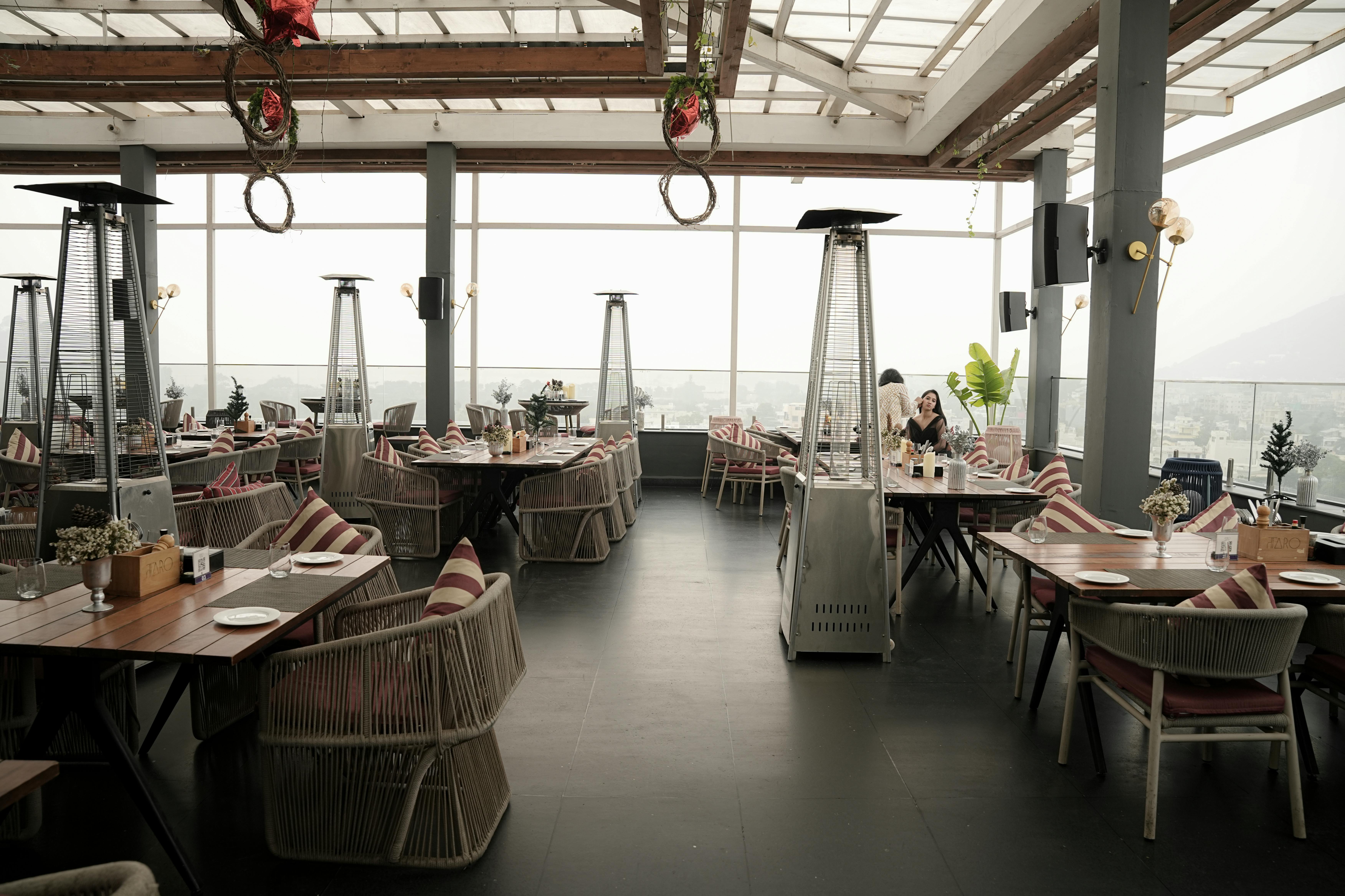 Cozy Rooftop Restaurant with Panoramic View · Free Stock Photo