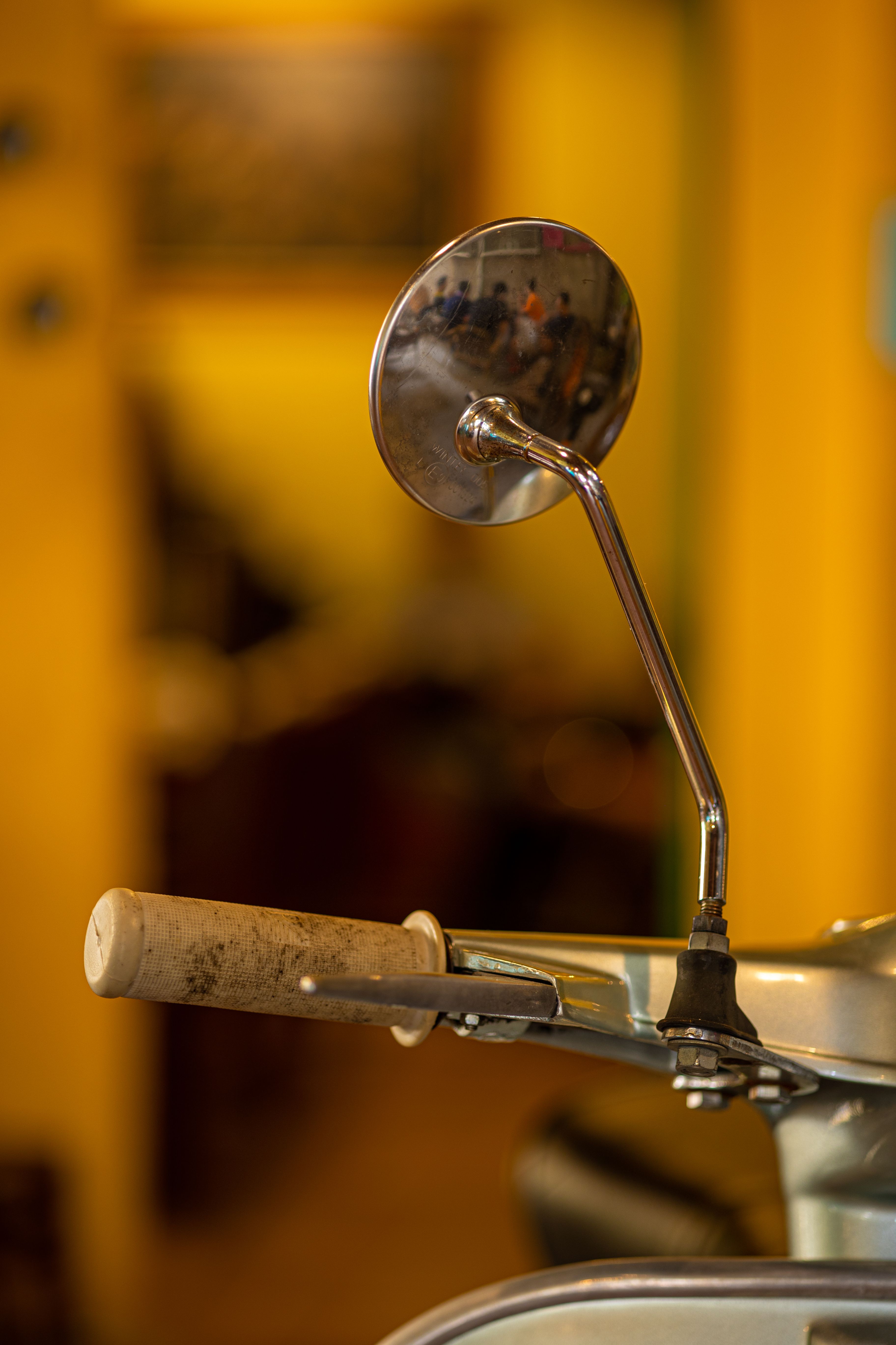 Close-Up of Vespa Handlebar and Mirror · Free Stock Photo