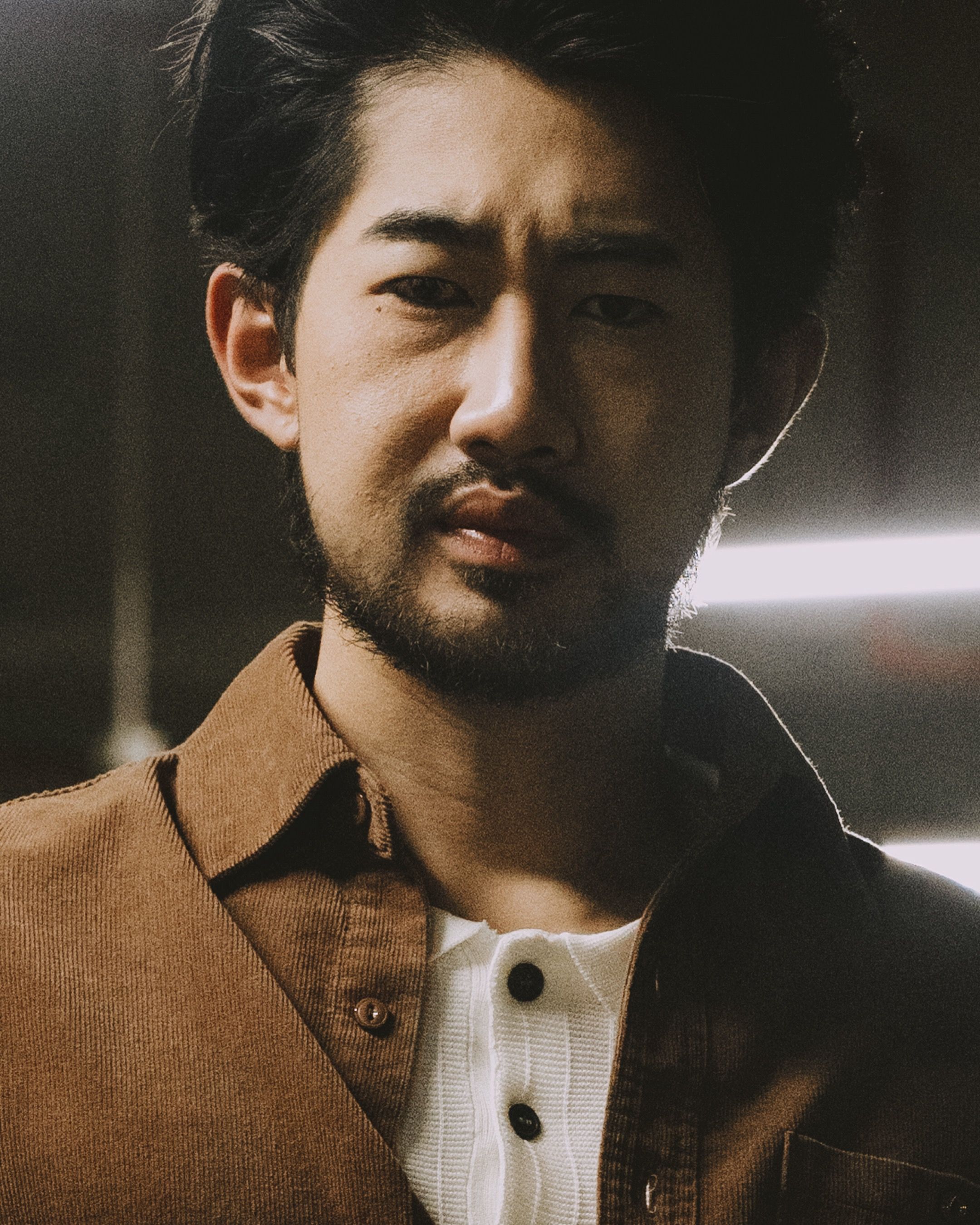 Portrait of Pensive Man in Dim Lighting · Free Stock Photo