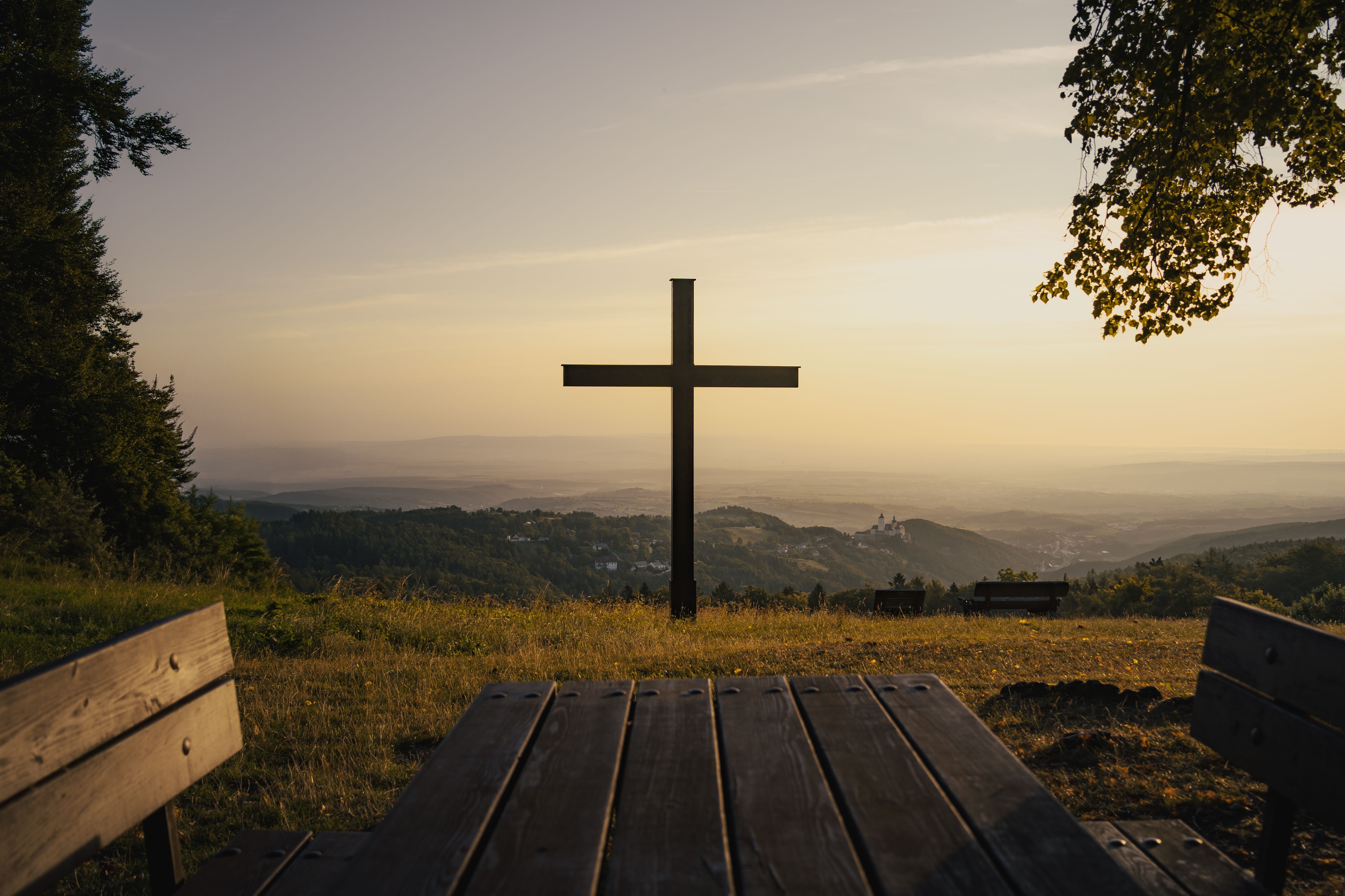 Sunset view of Cross on Austrian Hilltop · Free Stock Photo