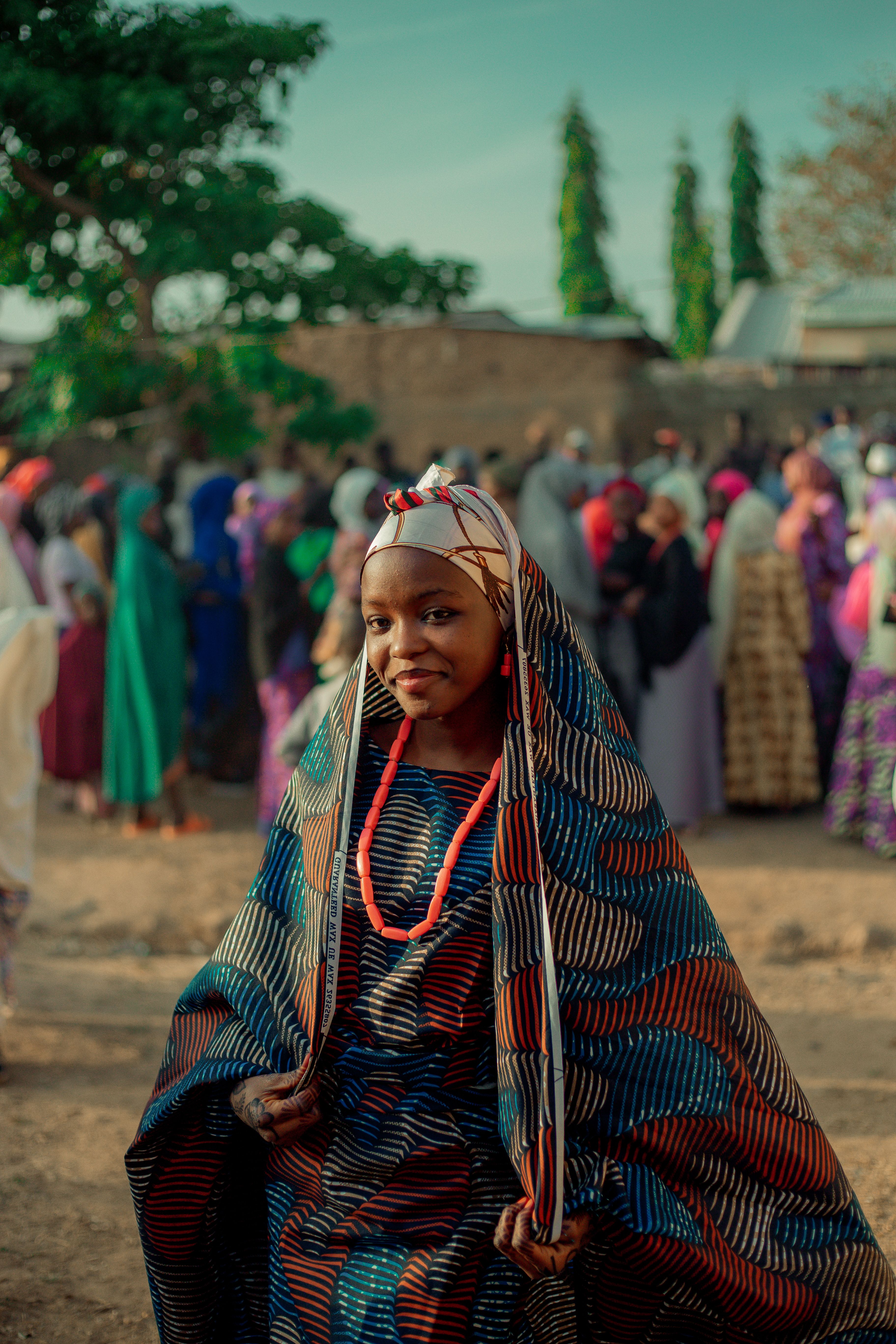 Colorful Traditional Attire in Vibrant Gathering · Free Stock Photo