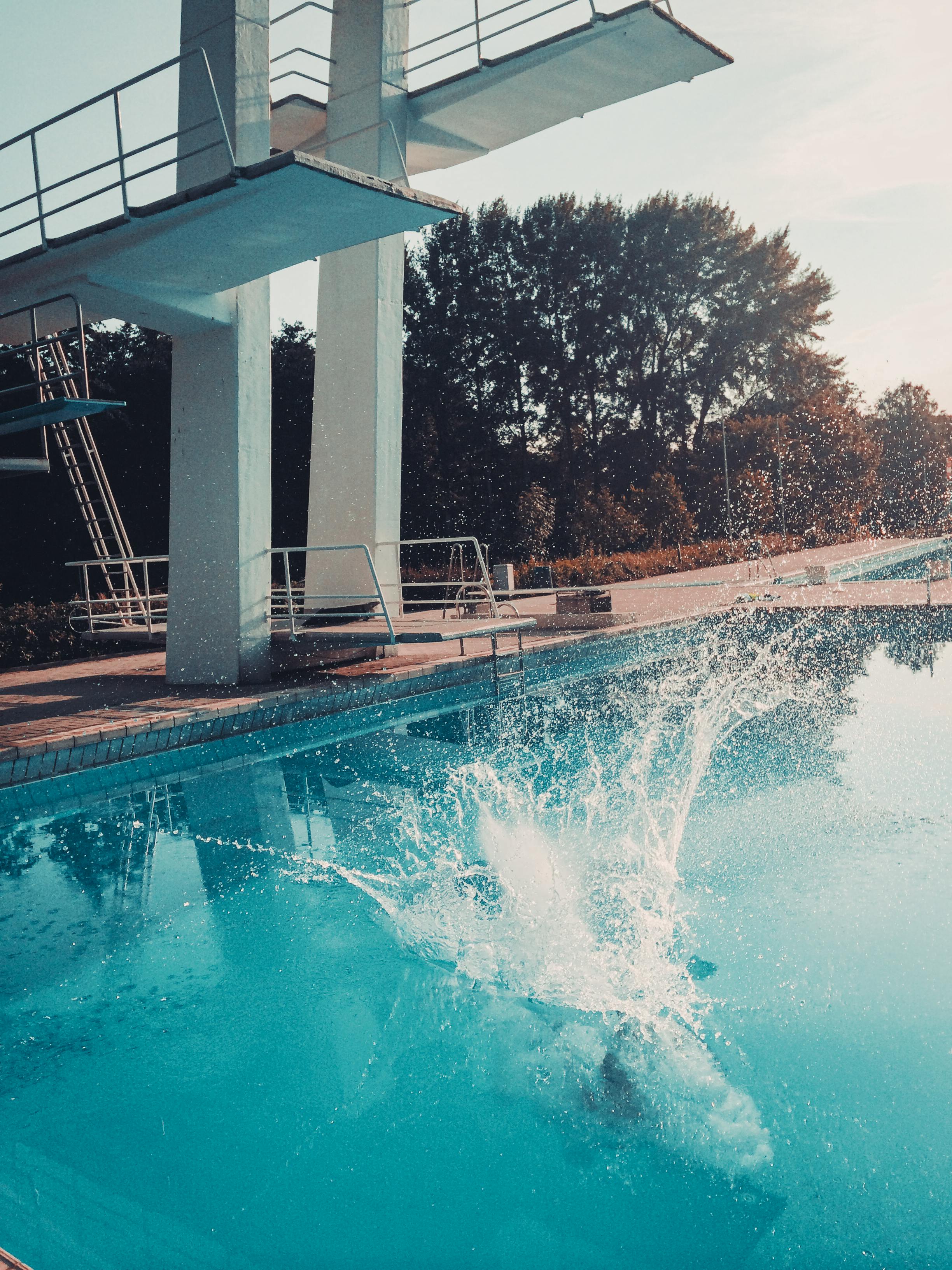 High Dive Splash at Outdoor Swimming Pool · Free Stock Photo