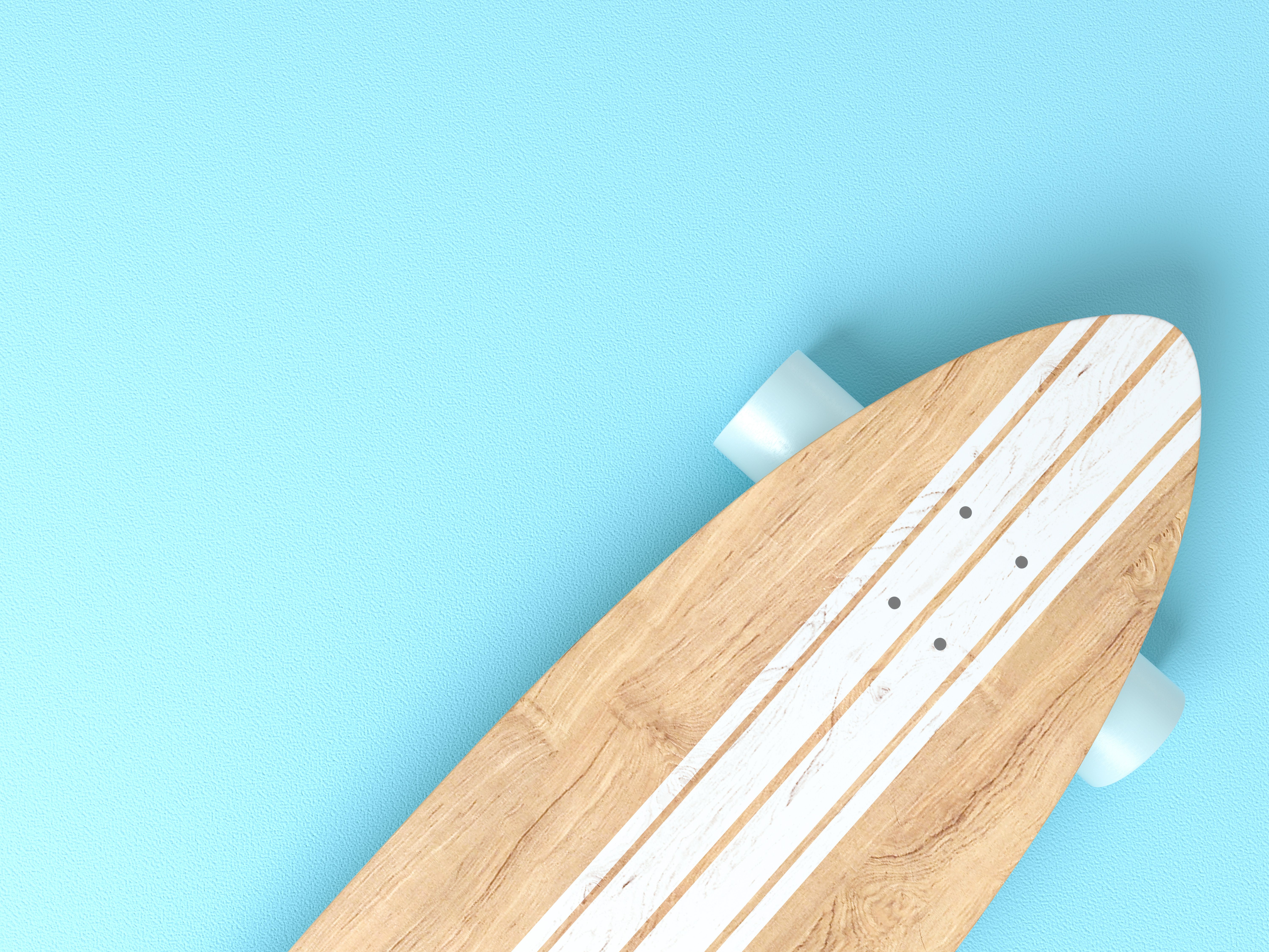 Minimalist Wooden Skateboard on Pastel Blue Background · Free Stock Photo